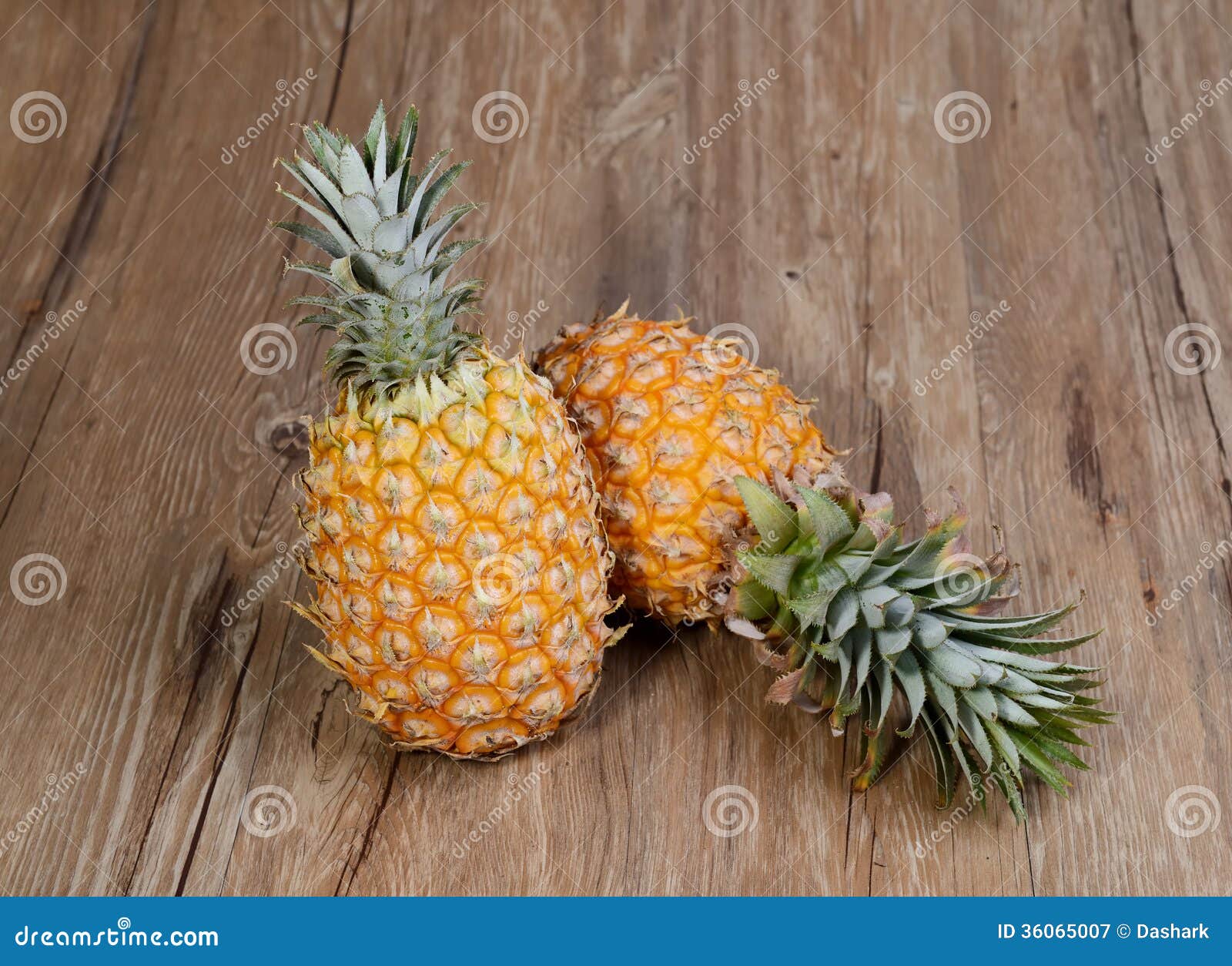 Two Pineapples on wood stock image. Image of brown, background - 36065007