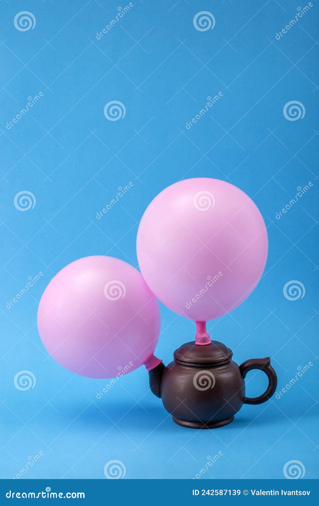Two Pink Balloons on a Teapot on a Blue Background Stock Image - Image ...