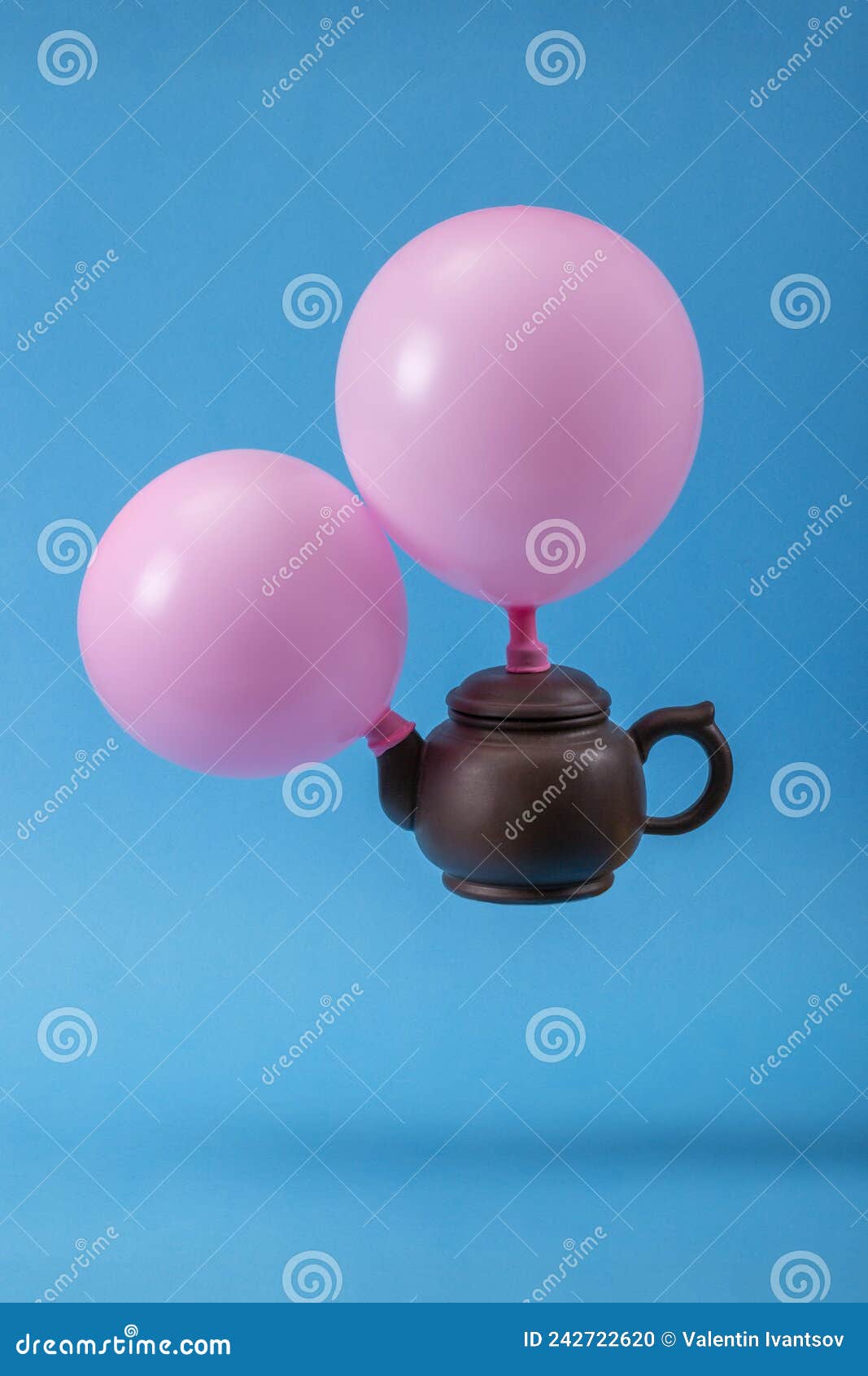 Two Pink Balloons on a Teapot on a Blue Background Stock Photo - Image ...