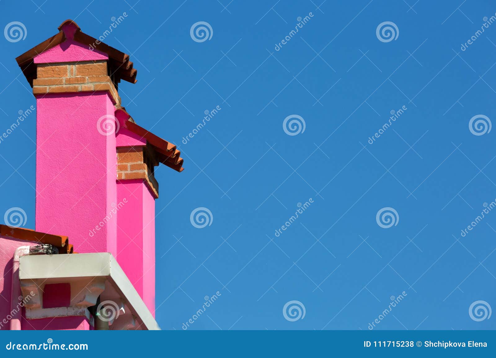 Two pink chimneys stock photo. Image of paint, landmark - 111715238