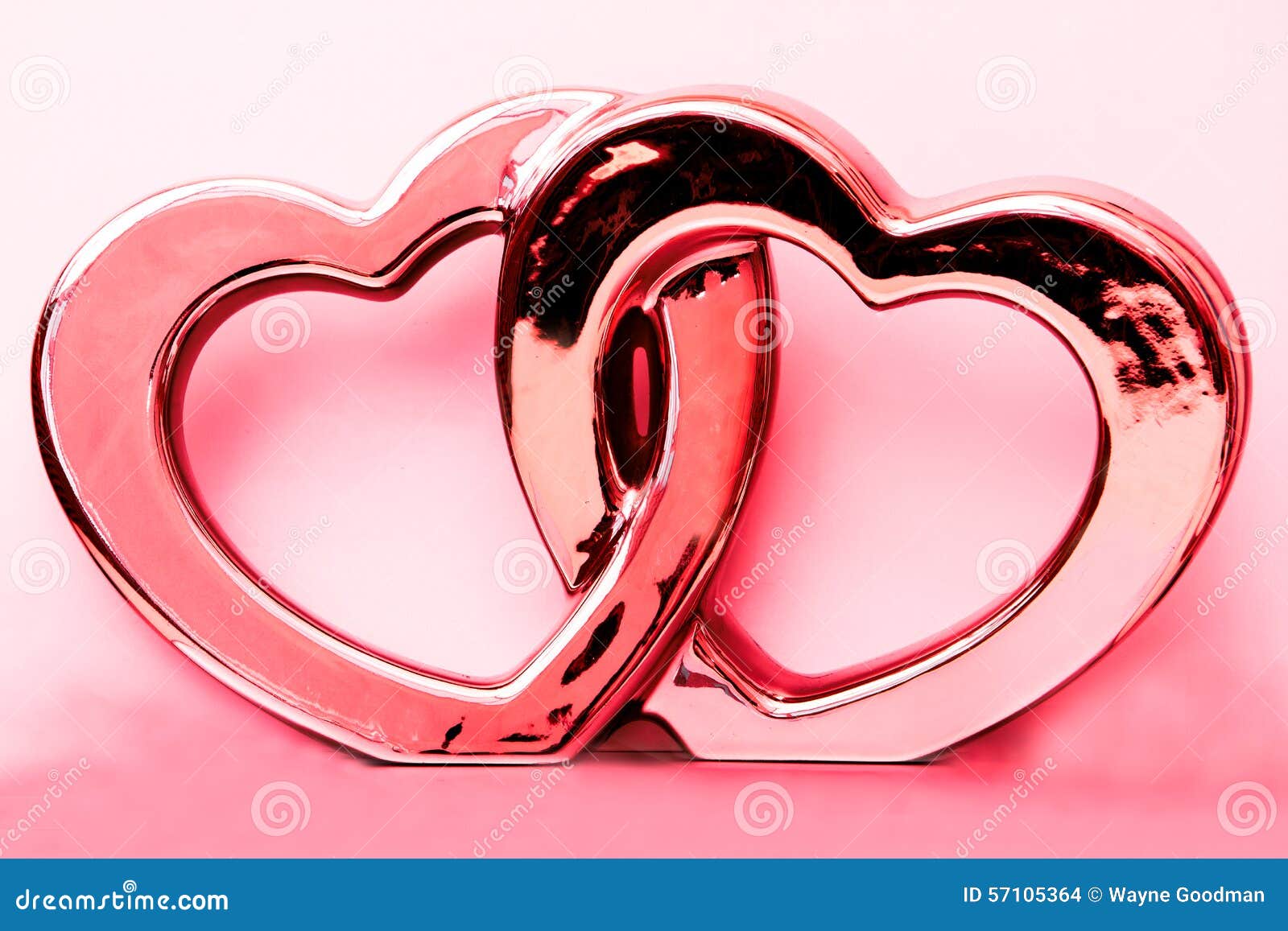 Two pink hearts intertwine stock photo. Image of pink - 57105364