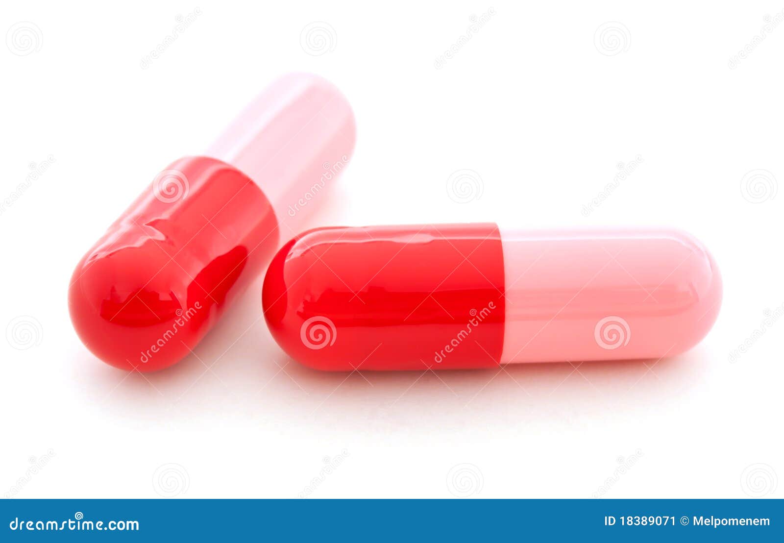Two Pink And Red Pills Stock Image - Image: 18389071