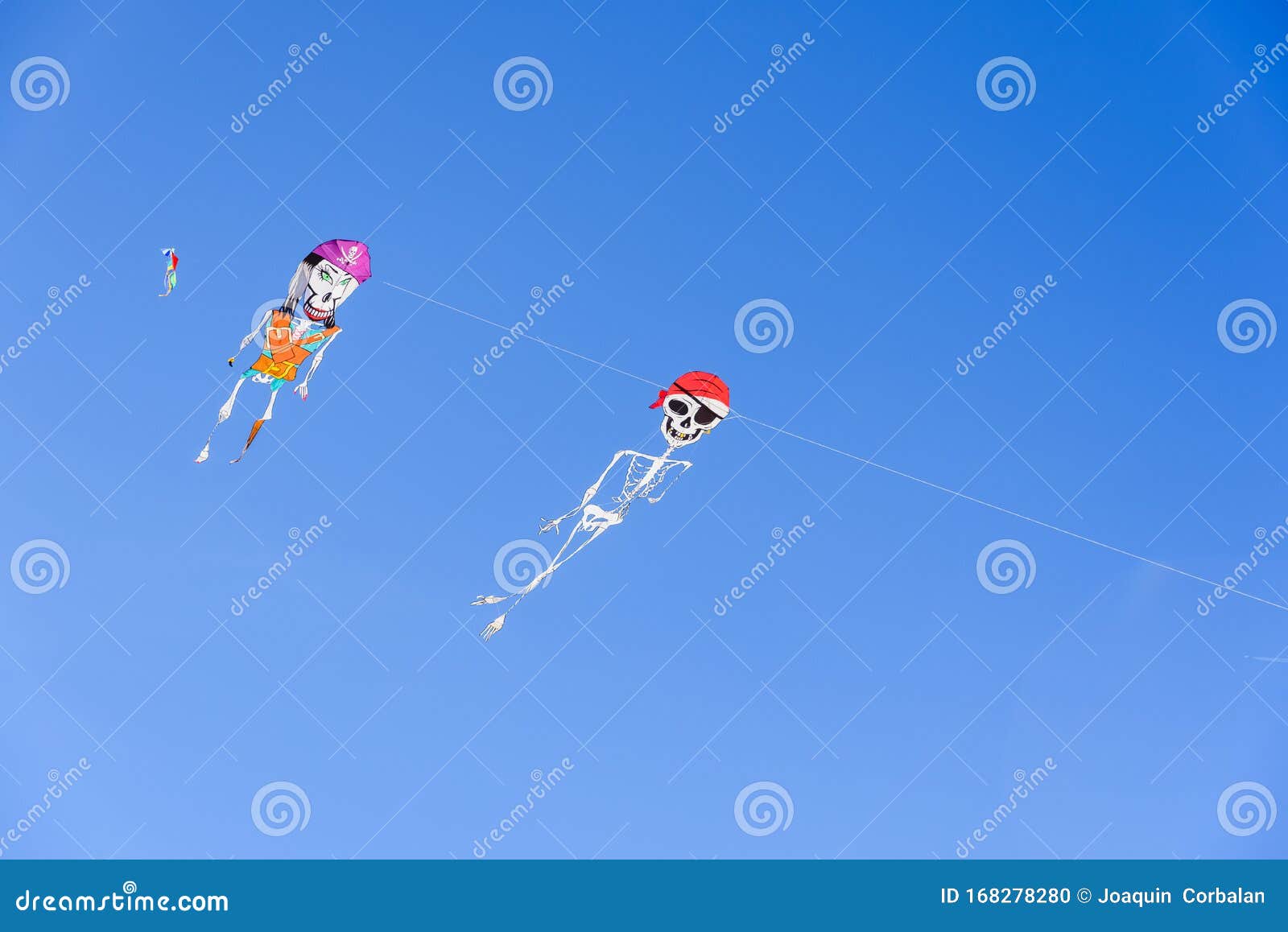 Two Pirate Skeleton Shaped Kites Fun Figures To Play On Hot Summer Days On The Beach Stock