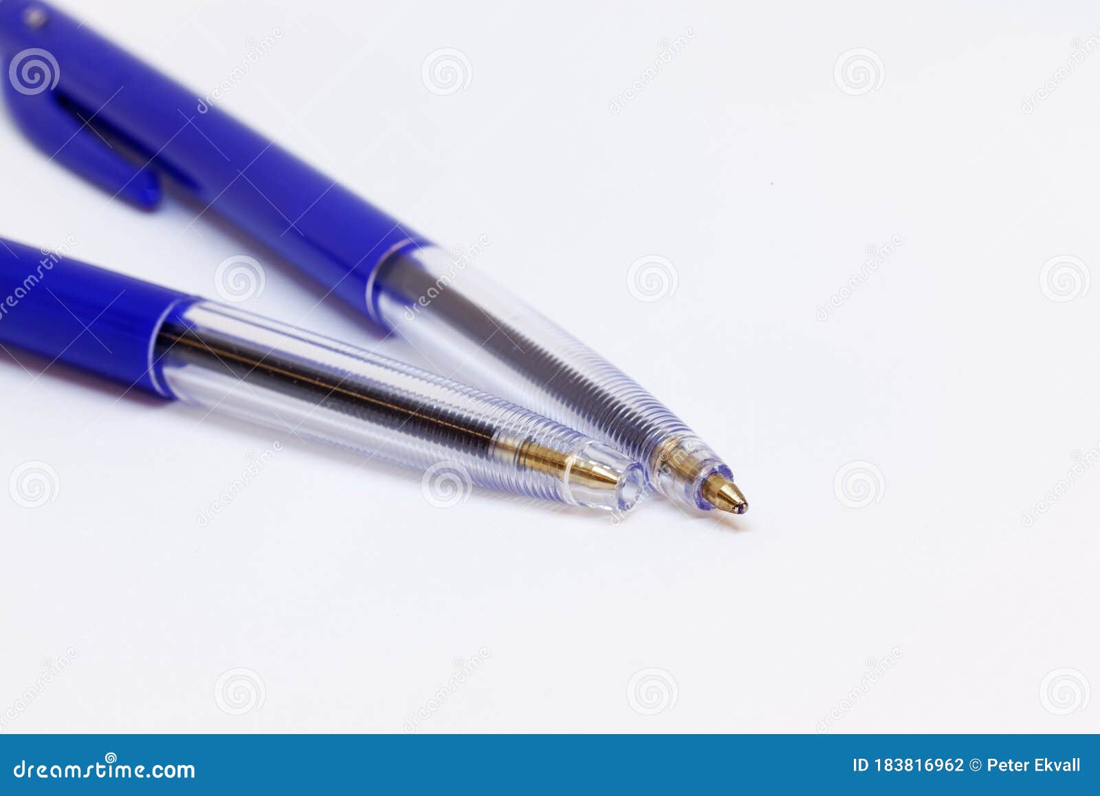 Two Plain Blue Ink Pens on White Background Stock Photo - Image of ...