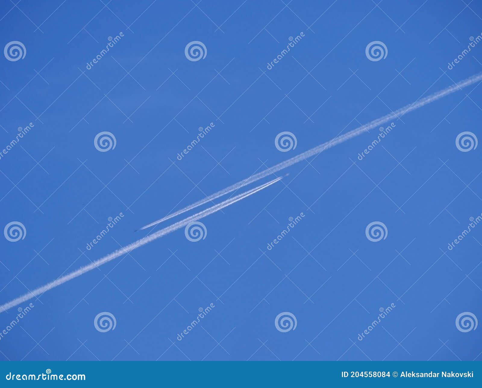 Two Planes Flying High in the Sky Stock Photo - Image of aviation, wing ...