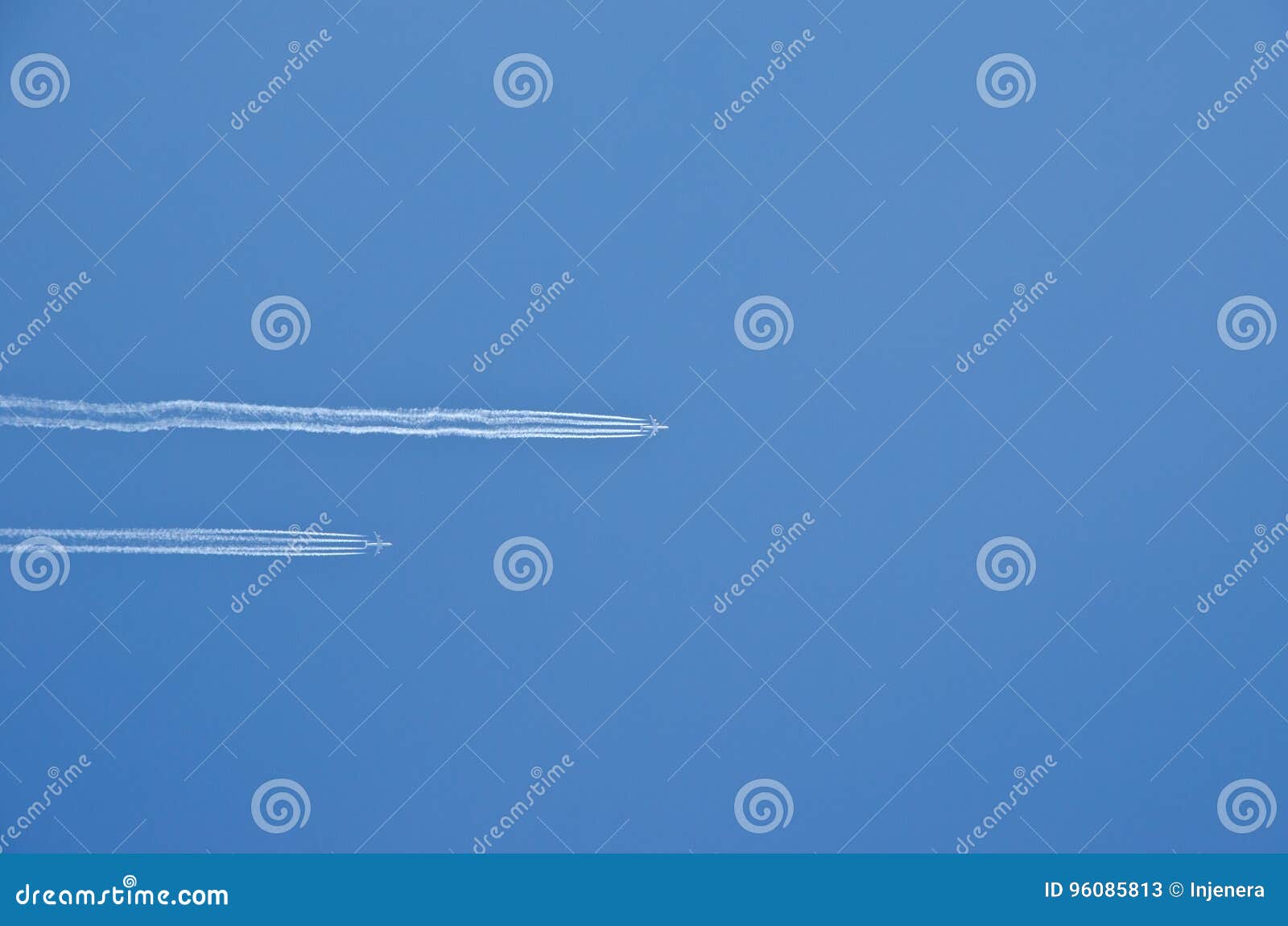 Two Planes Flying in Parallel Stock Image - Image of track, airplane ...