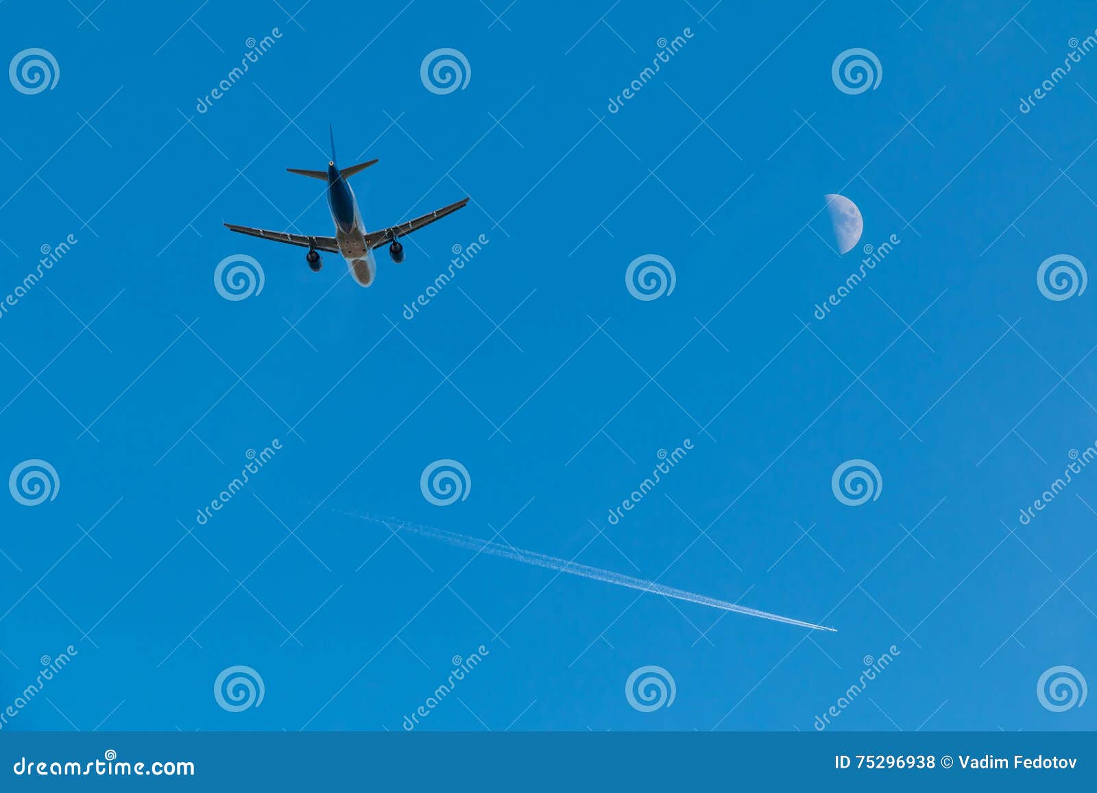 Two Planes and Moon in the Sky Stock Photo - Image of horizontal, trail ...