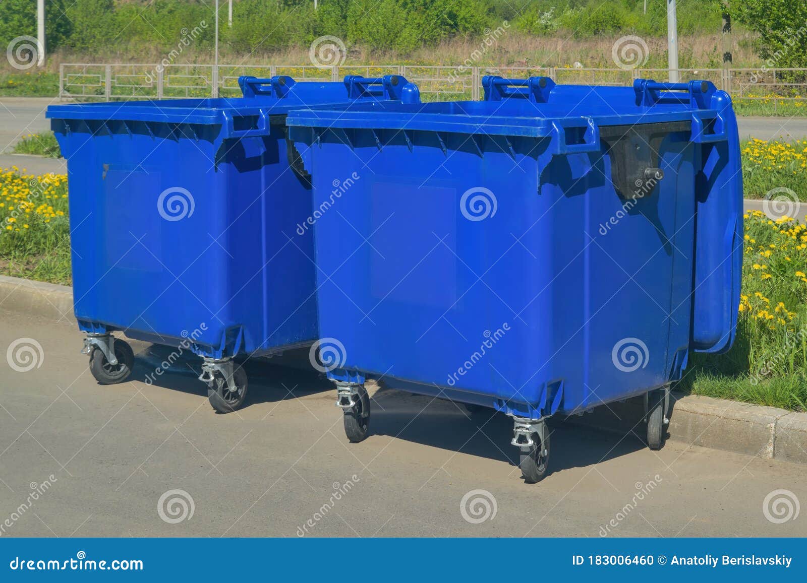 Two Plastic Trash Recycling Containers. Blue Containers for Collecting ...
