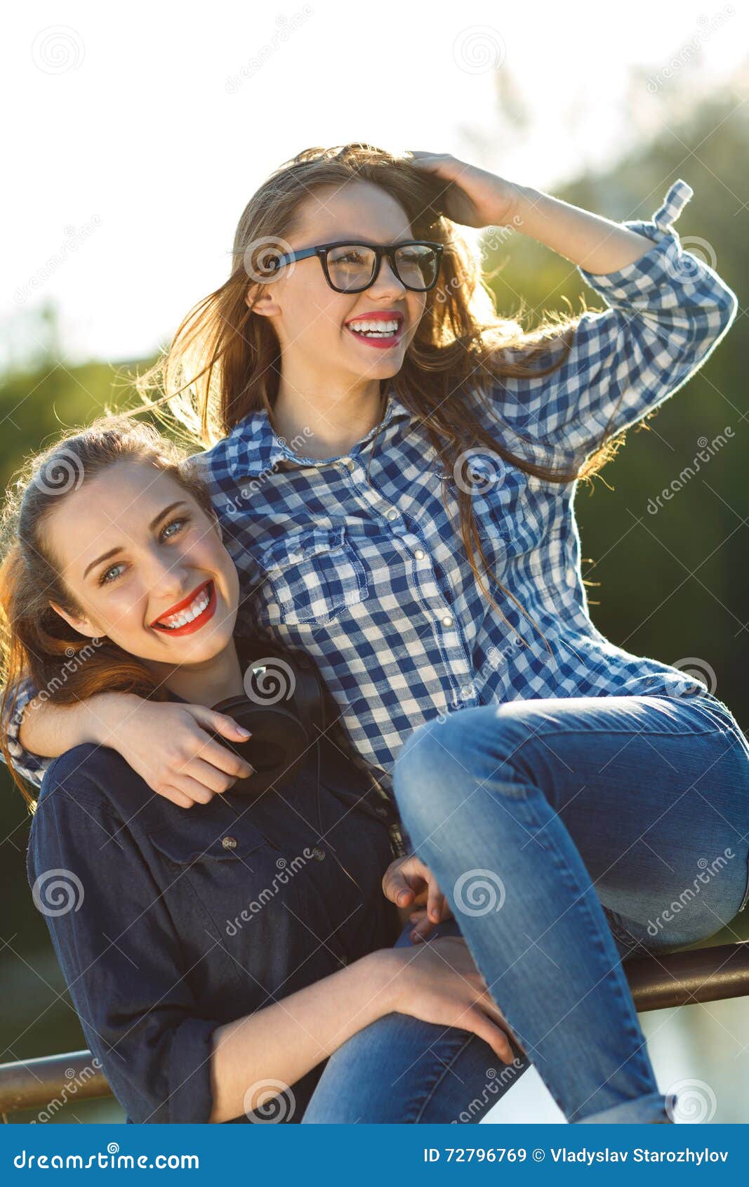 Two Playful Girls Having Fun Outdoors At Sunset Light Stock Image Image Of Summer Freedom