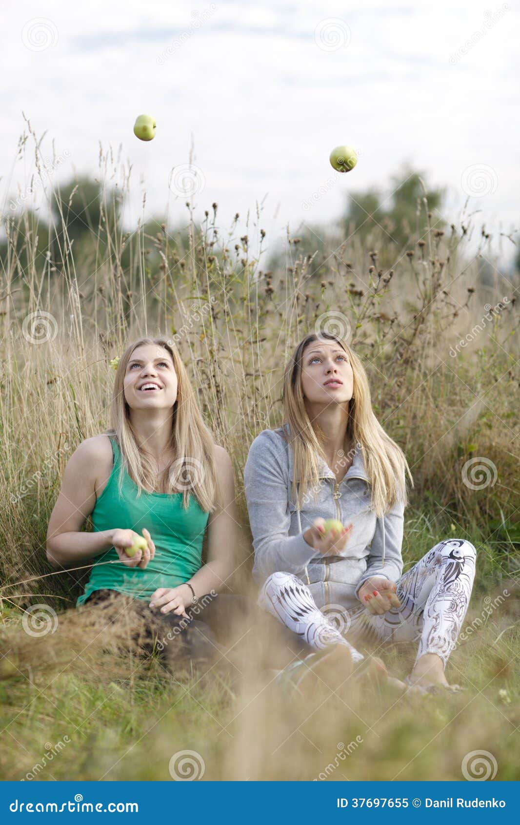 Two Playful Girls Juggling Outdoors Stock Image - Image of skill ...