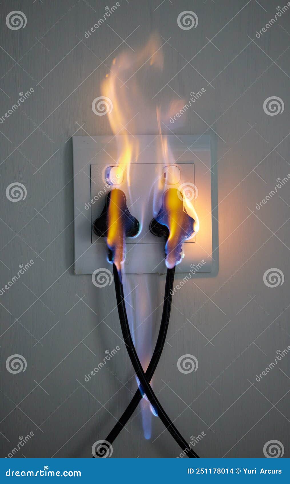 It Can Happen To Anyone. Two Plugs in a Wall Socket Catching Fire ...