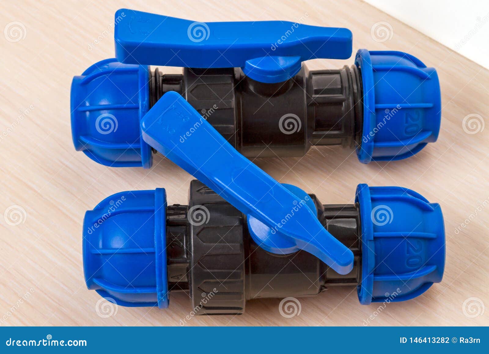 Two polyethylene valves stock photo. Image of faucet - 146413282