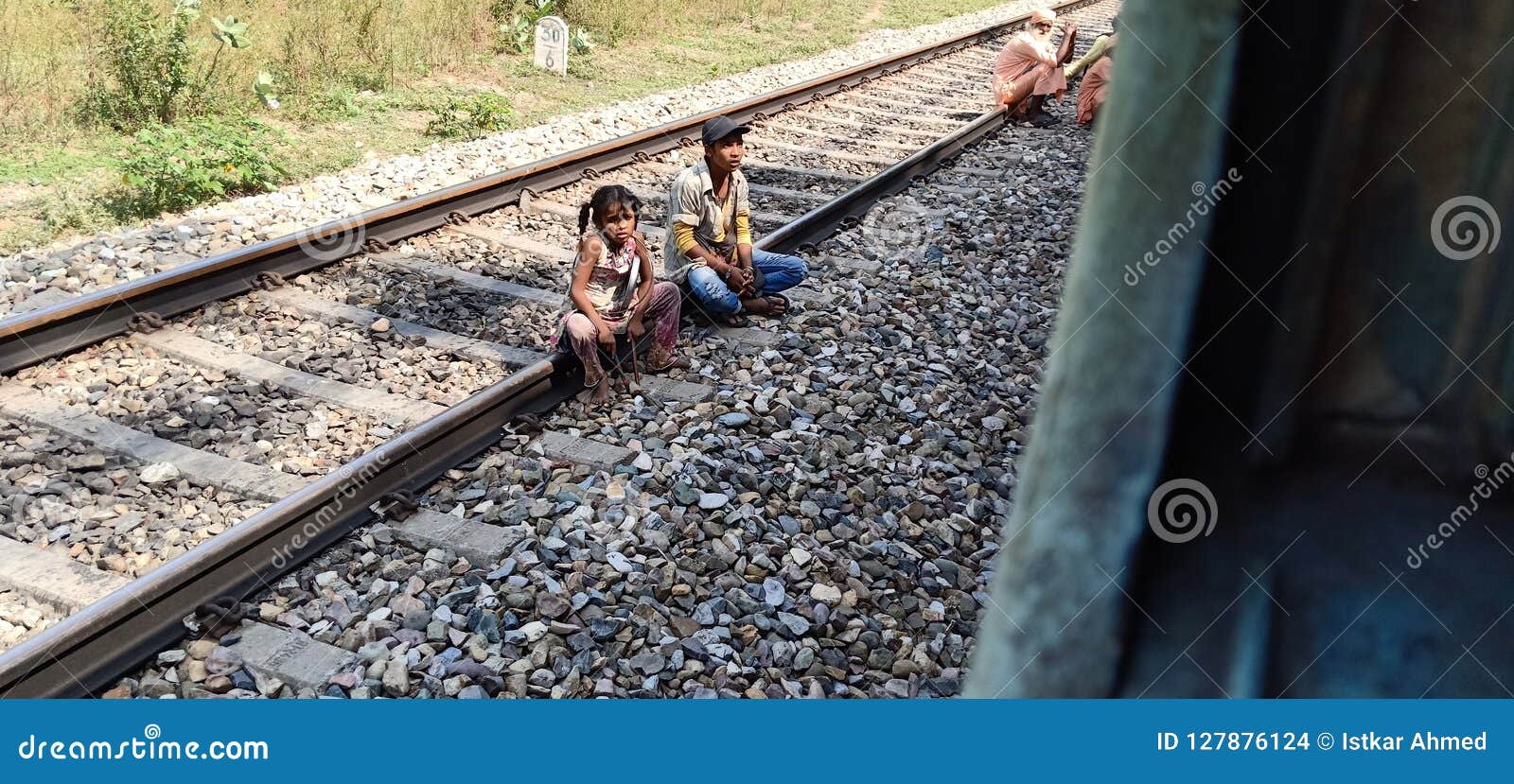Two poor guys on track editorial stock image. Image of waiting - 127876124