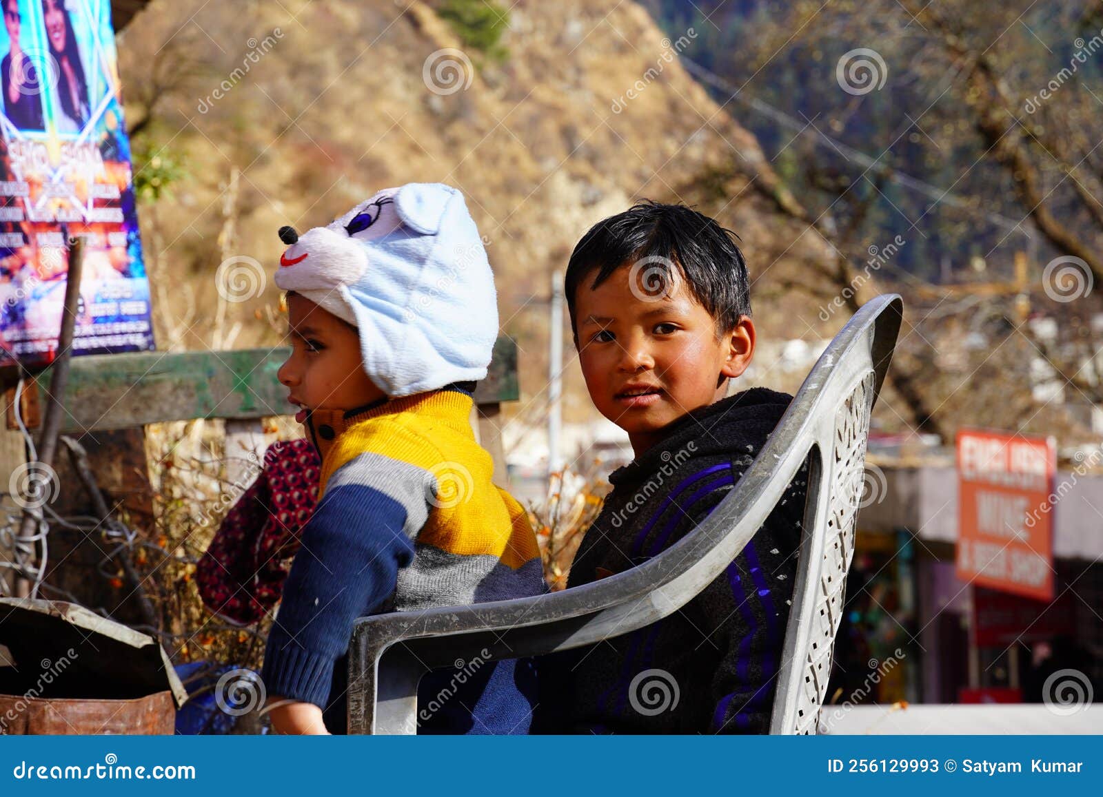 Two Poor Kids Sitting on Chair Image Editorial Stock Photo - Image of ...