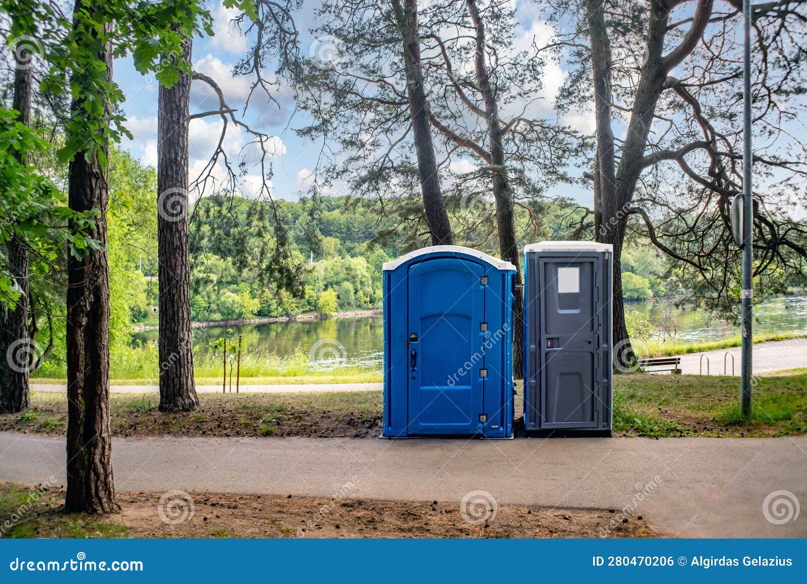Two Portable Toilets in a Park Stock Photo - Image of sanitation, male ...