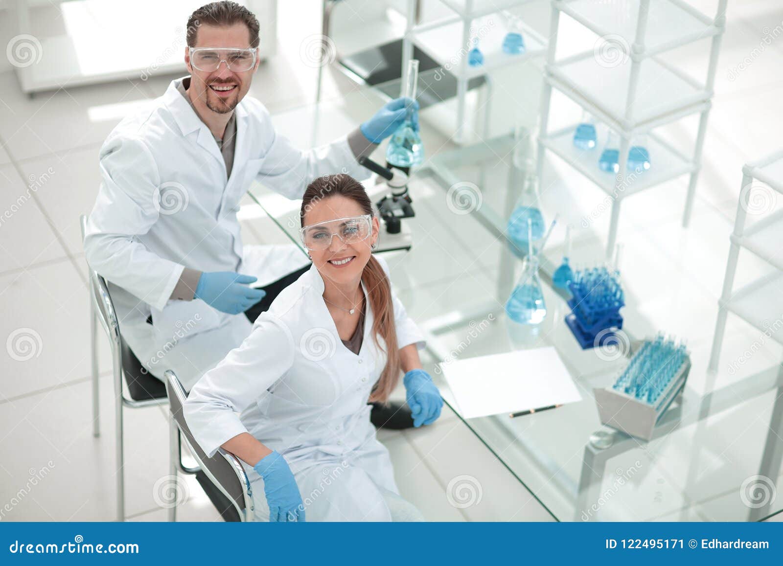 Two Positive Scientists are Working in the Laboratory. Stock Image ... Two Positive Scientists are Working in the Laboratory. Stock Image ...