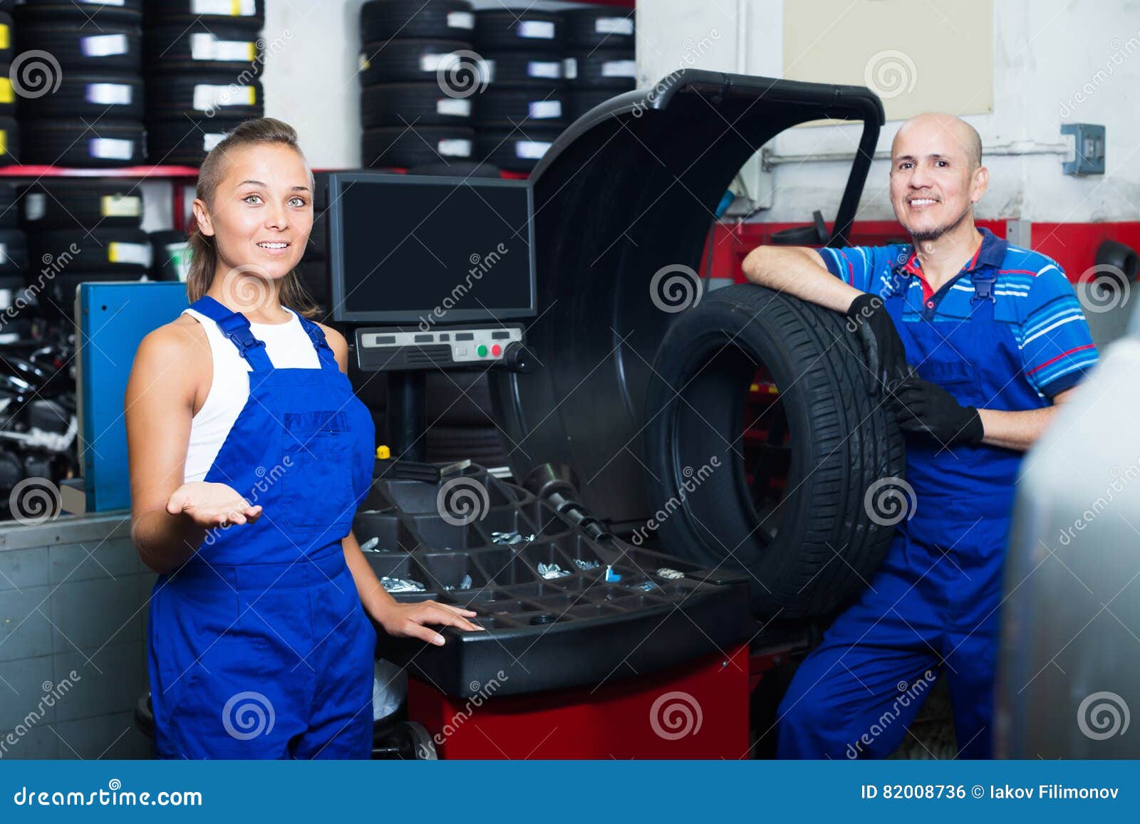 Two Positive Technicians Working in Car Service Stock Photo - Image of ...