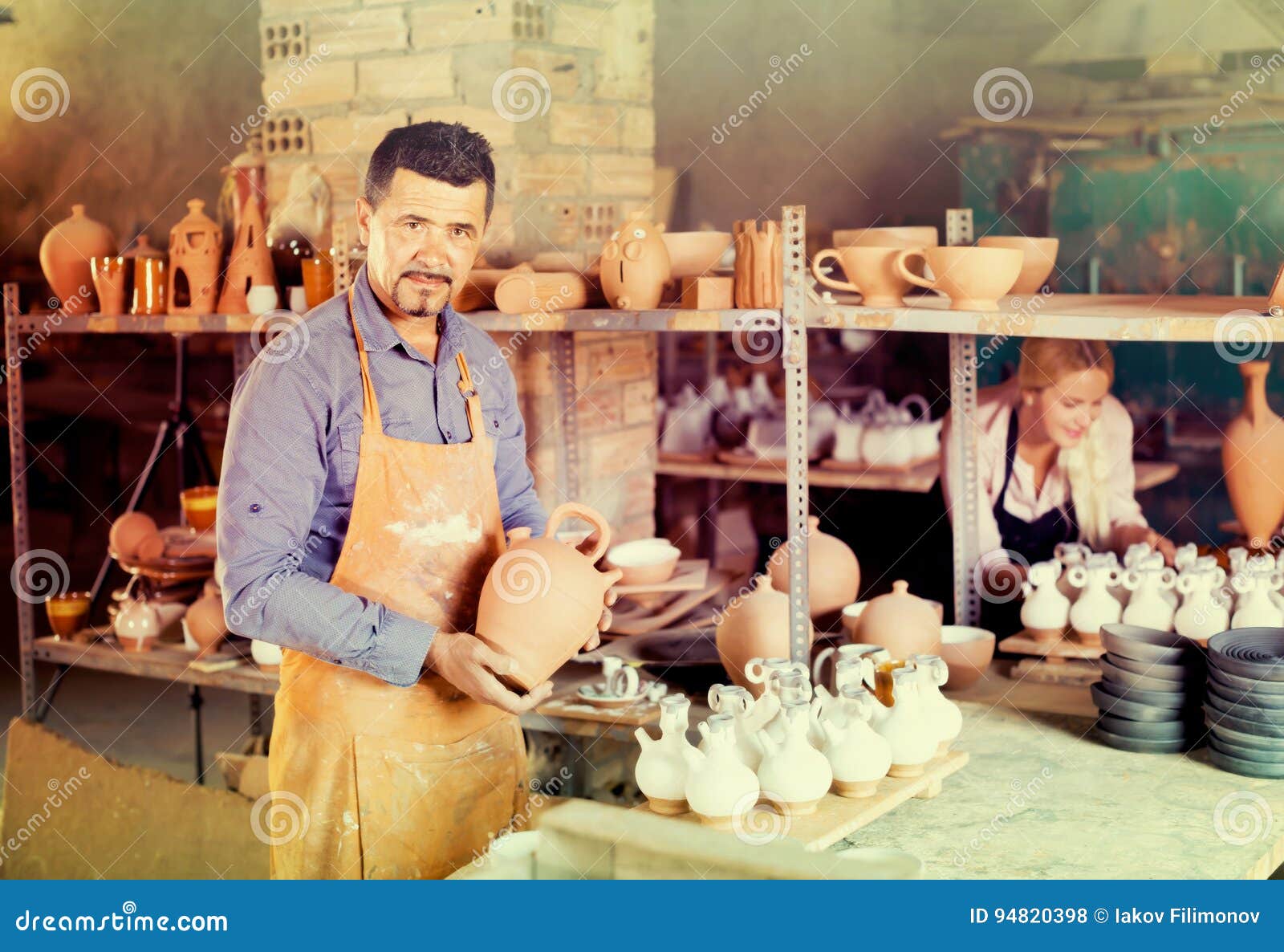 Two Potters Working in Workshop Stock Photo - Image of craftsman ...
