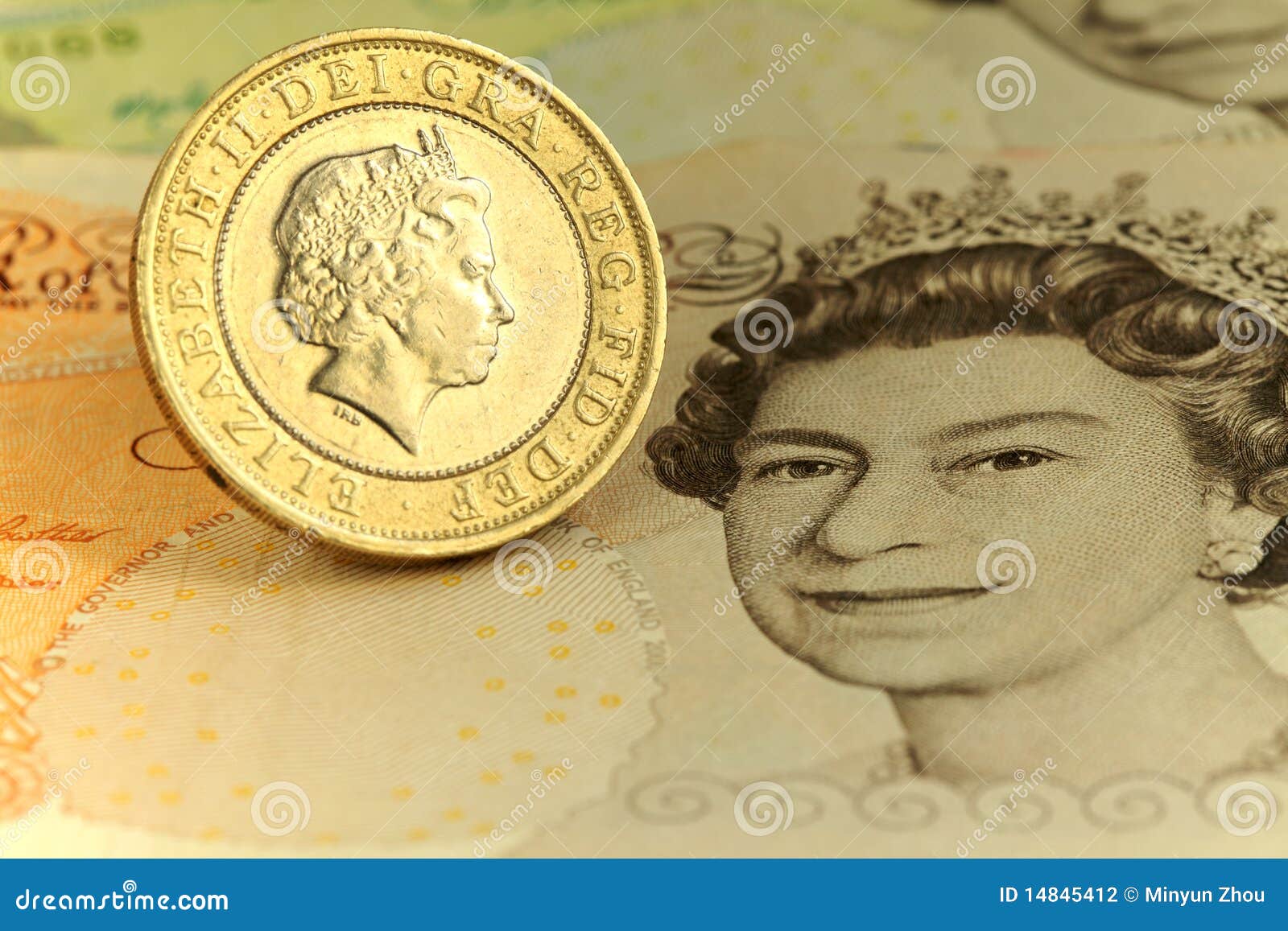 One Pound Coin With The Face Of Queen Elizabeth II In Front Of A 1 Euro ...