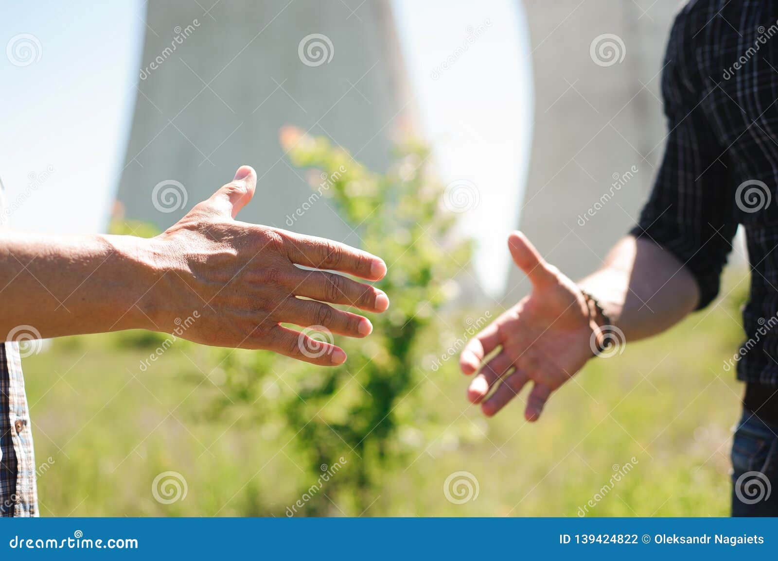 Two Power Line Tower Workers with Handshaking. Stock Photo - Image of ...