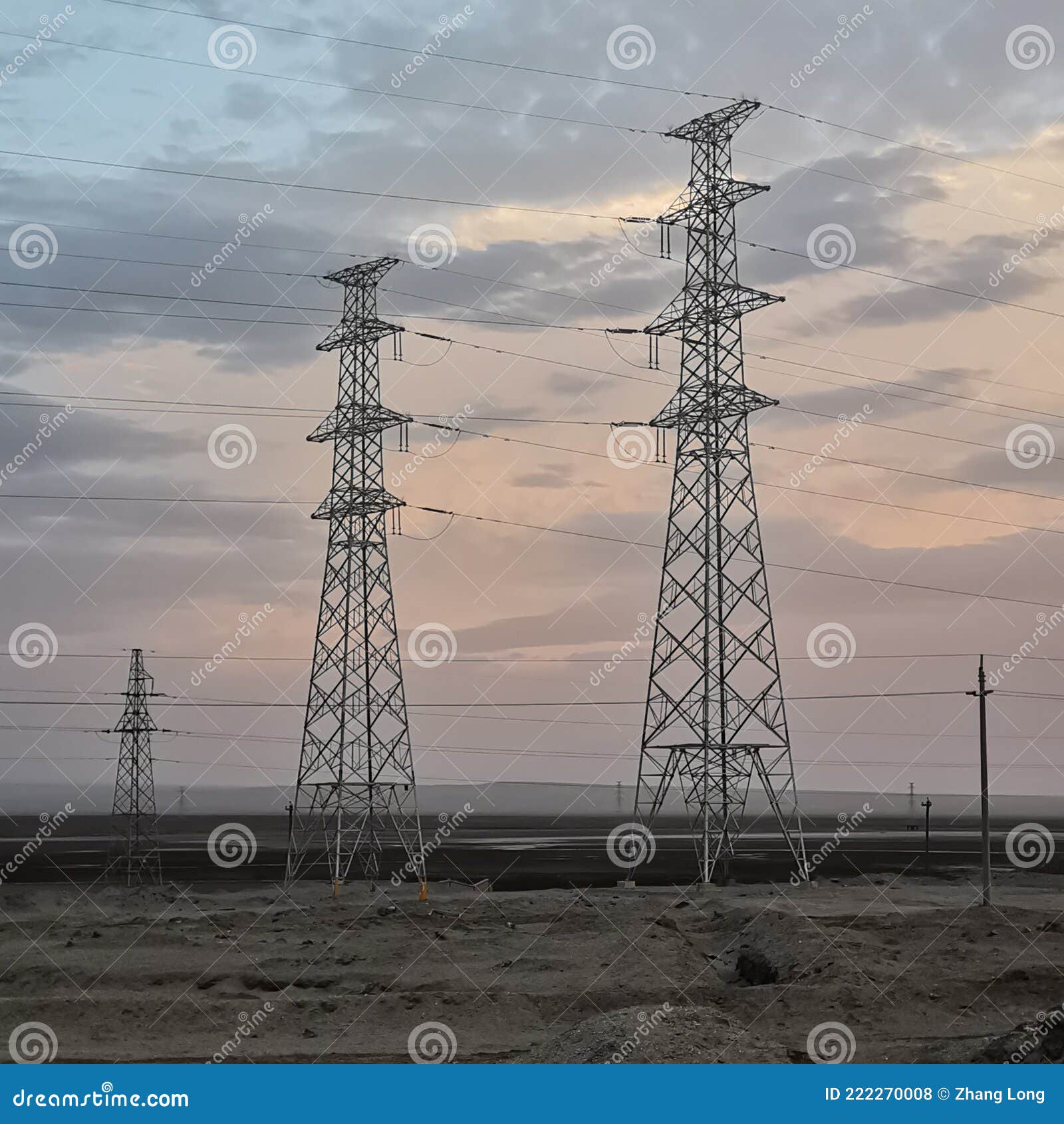 Two power towers stock photo. Image of windmill, power - 222270008