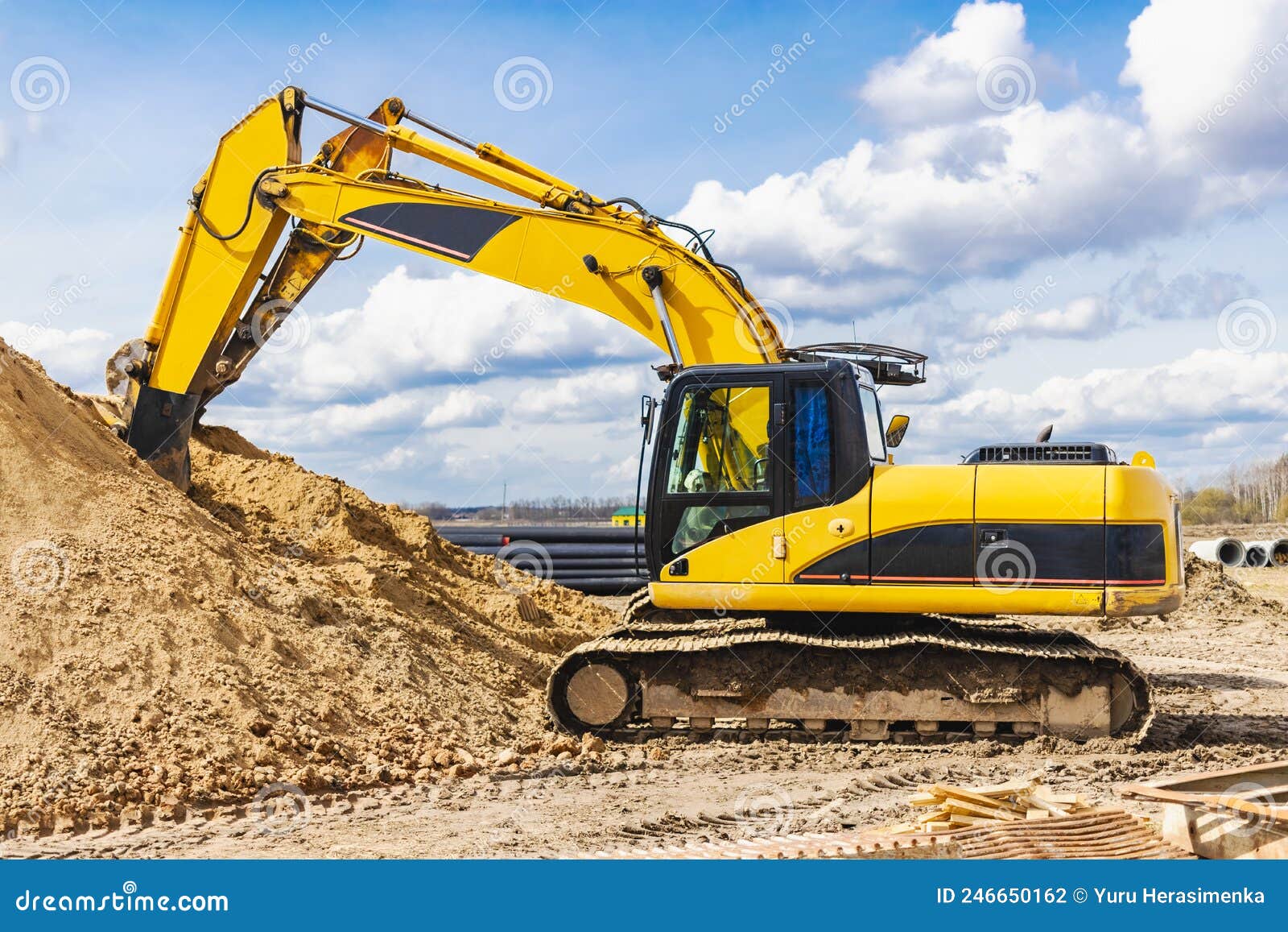 Two Powerful Excavators Work at the Same Time on a Construction Site ...