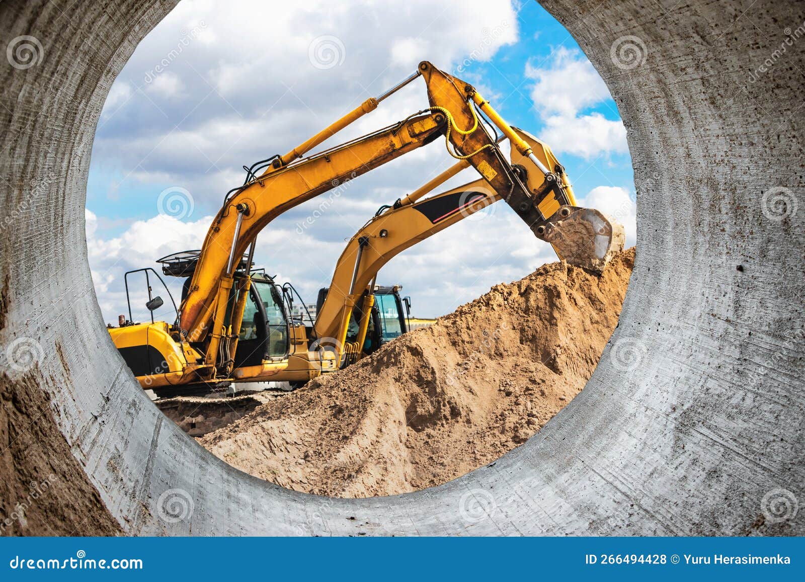 Two Powerful Excavators Work at the Same Time on a Construction Site ...