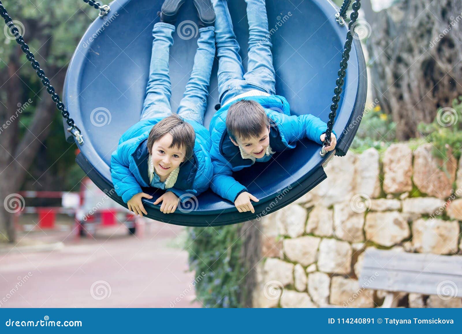 Two Preschool Children in a Swing, Having Fun Stock Image - Image of ...
