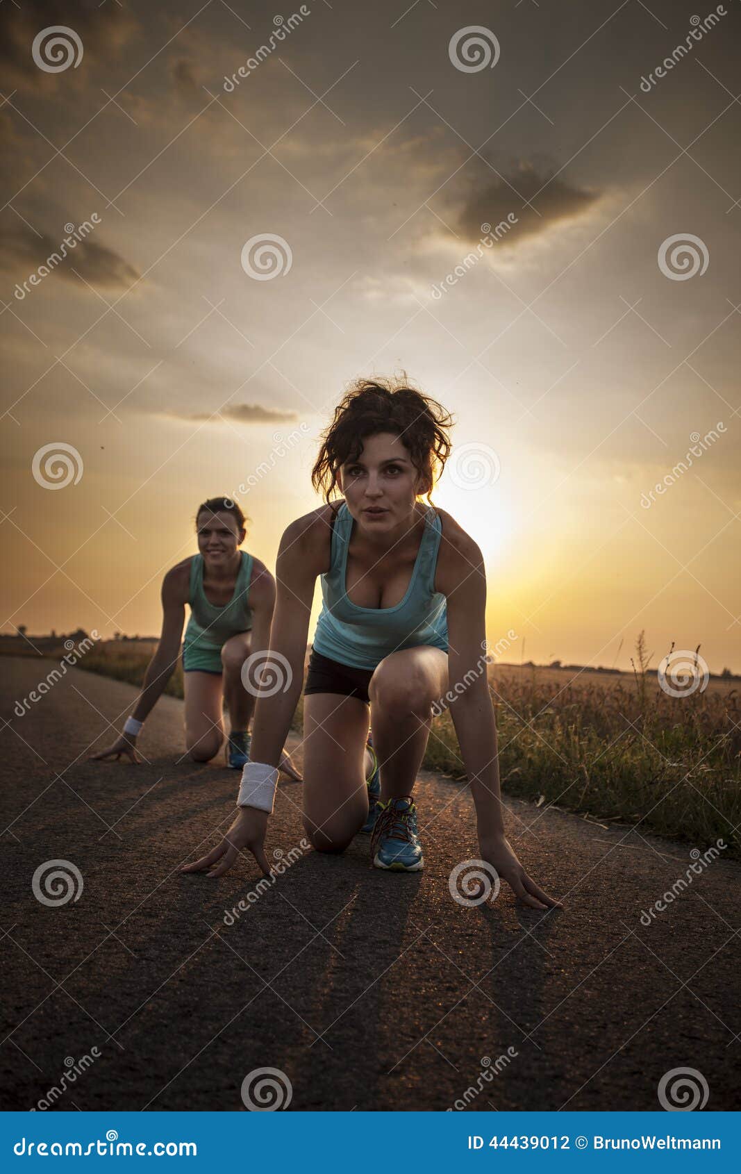 Two Pretty Girls Jogging in the Morning Stock Photo - Image of road ...