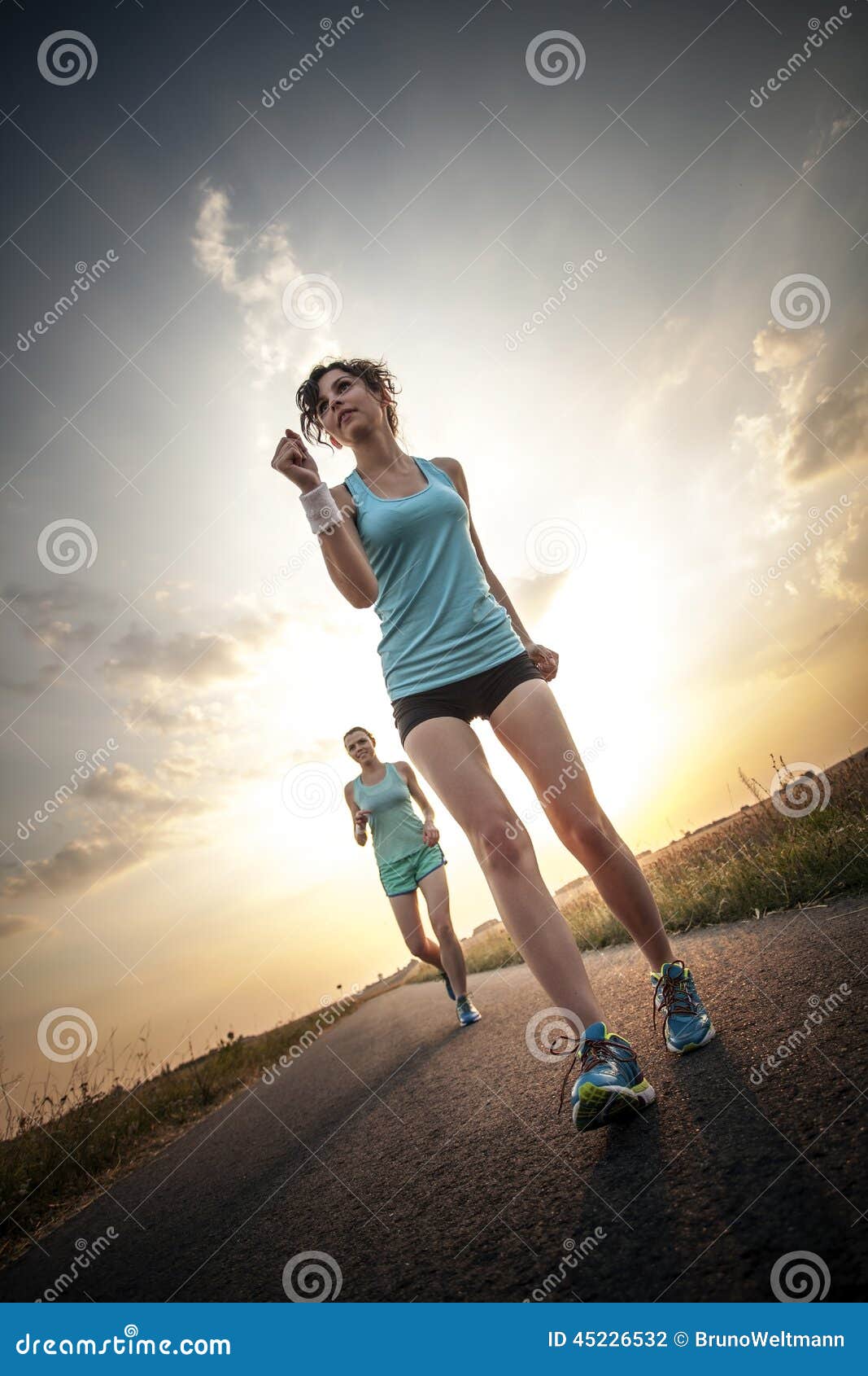 Two pretty girls jogging stock photo. Image of country - 45226532