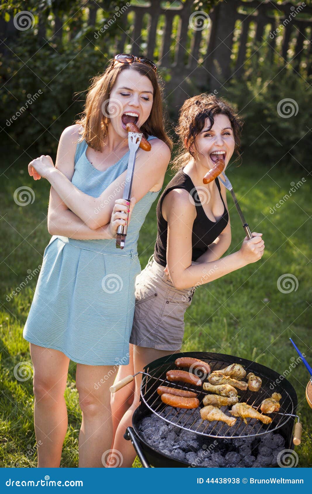Two Pretty Girls Making Food on Grill Stock Photo - Image of meat ...