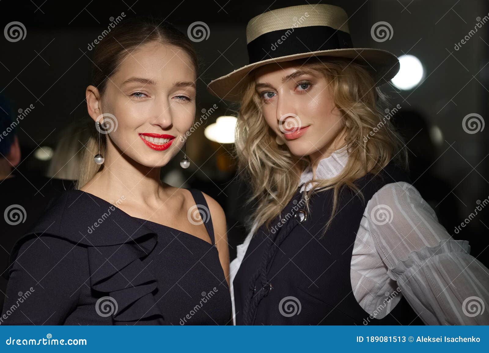 Two Pretty Models Posing To Camera at Backstage of Fashion Week Stock ...