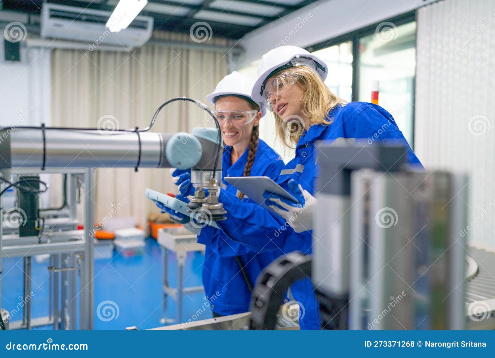 Two Pretty Professional Technician or Engineer Women Help To Check the ...