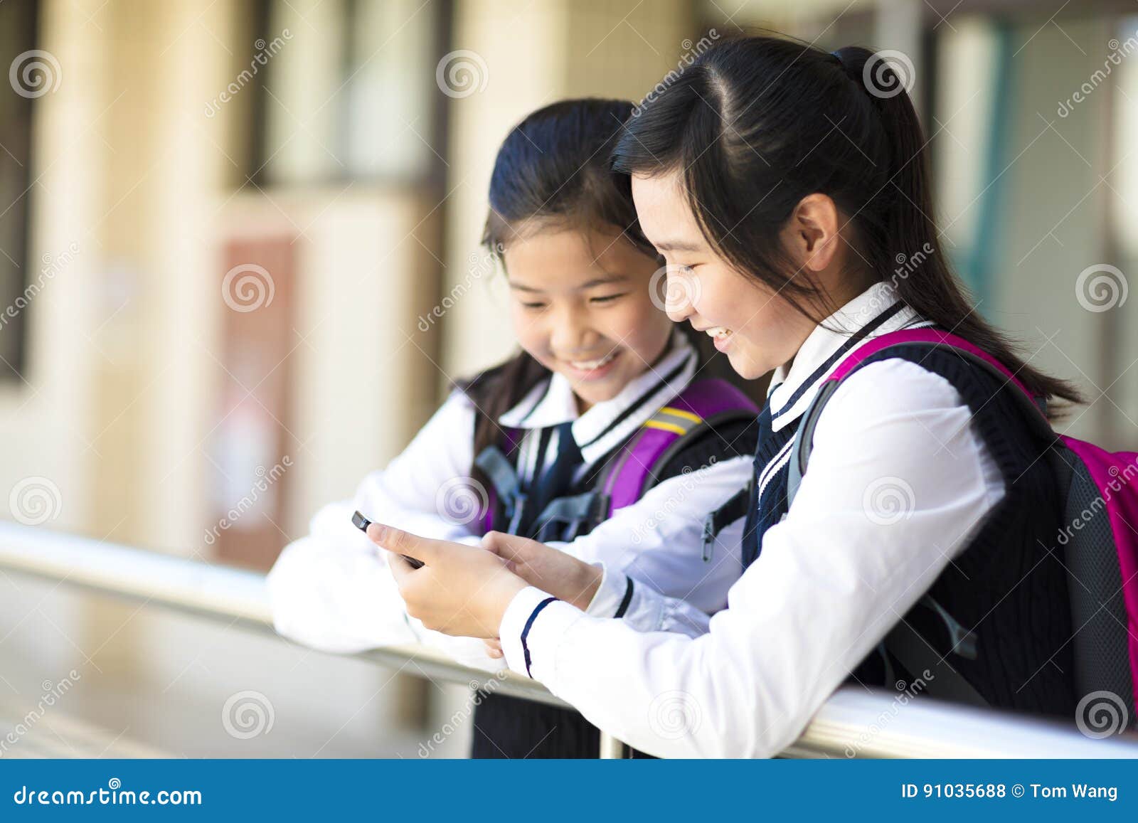 Two Pretty Student Girls Looking the Smart Phone Stock Photo - Image of ...