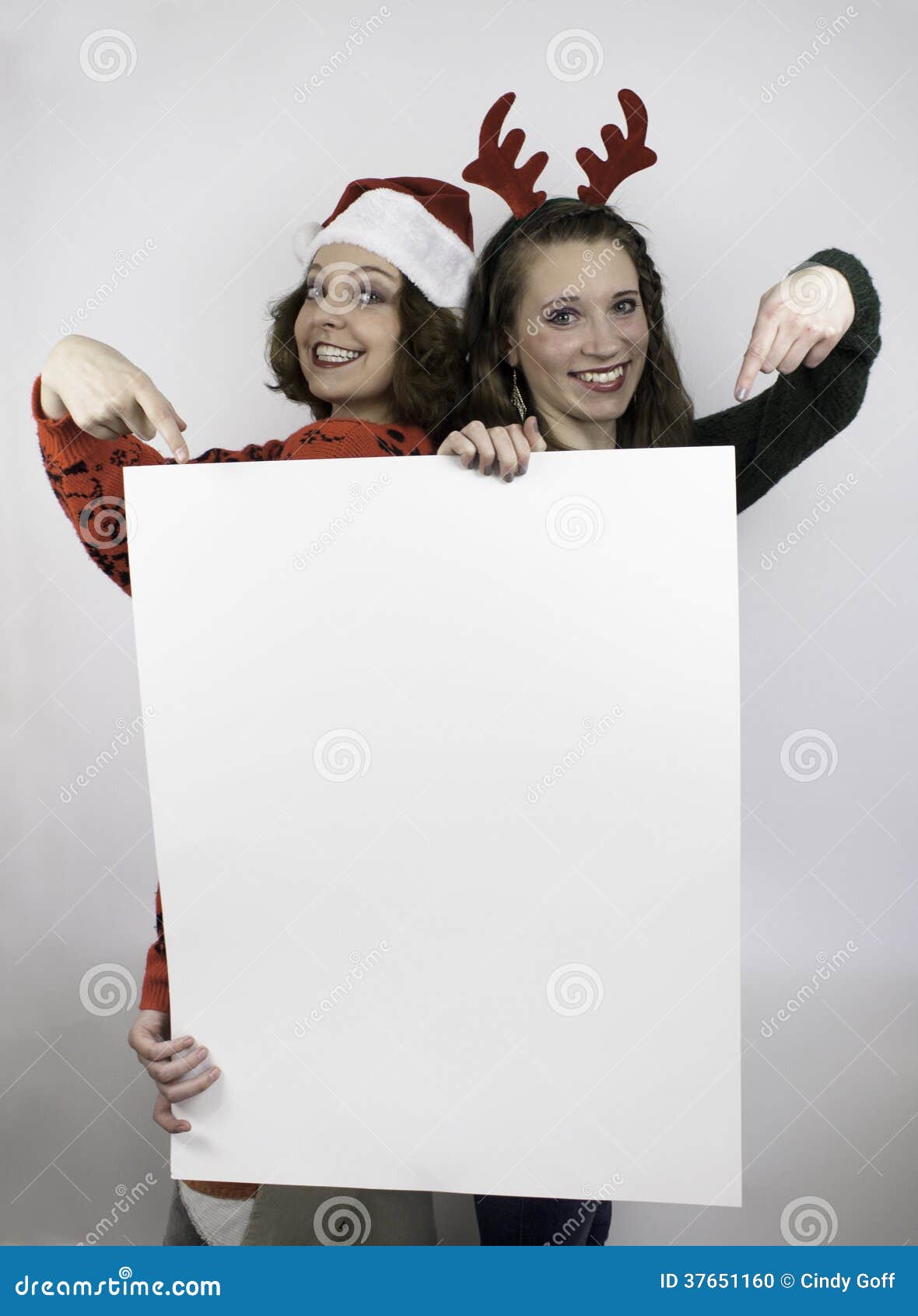 Two Pretty Women Holding Sign for Copy Space Stock Photo - Image of ...
