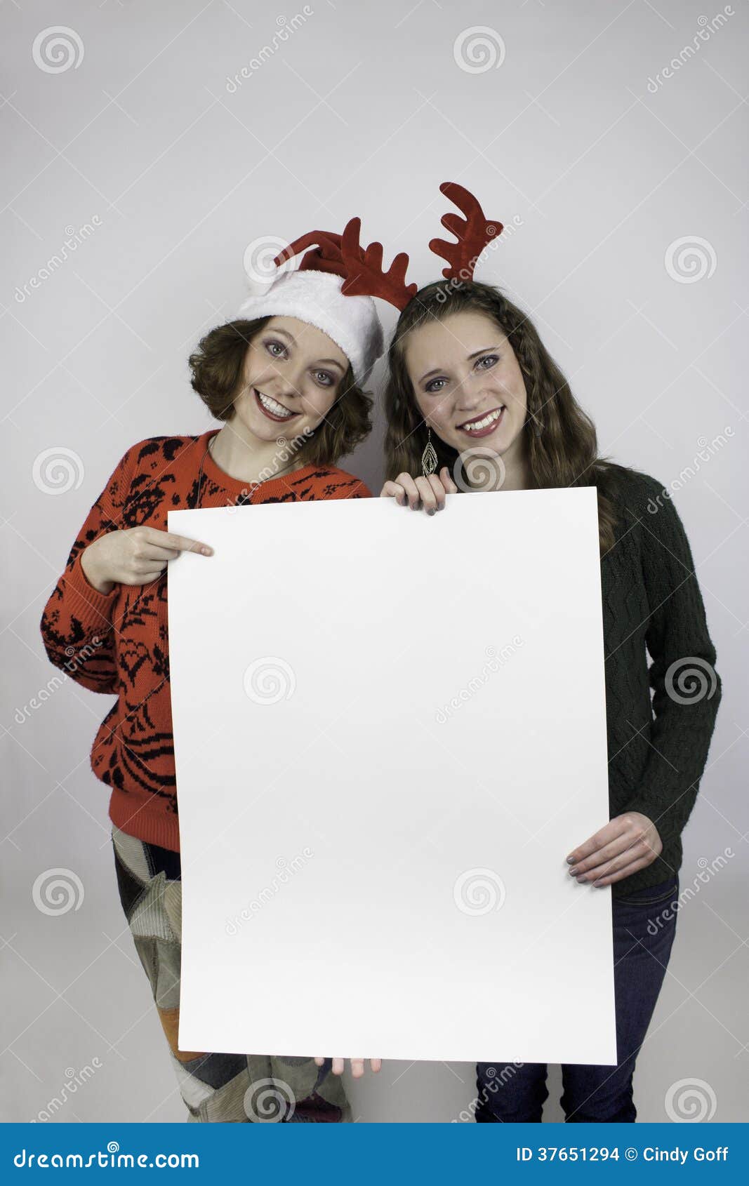 Two Pretty Women Holding Sign for Copy Space Stock Photo - Image of ...