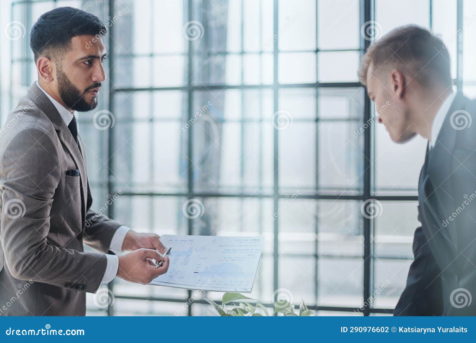 Two Professional Businessmen Discussing and Using Desktop Computer in ...