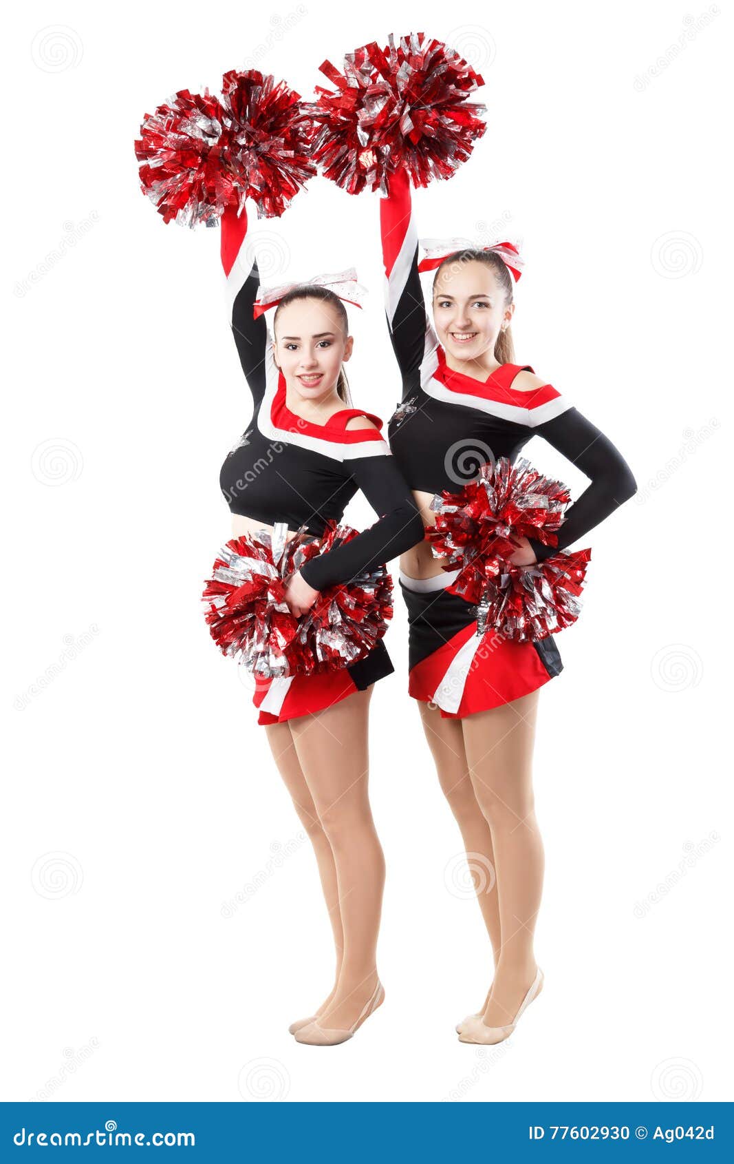 Two Professional Cheerleaders Posing At Studio. Side Split And Vertical ...