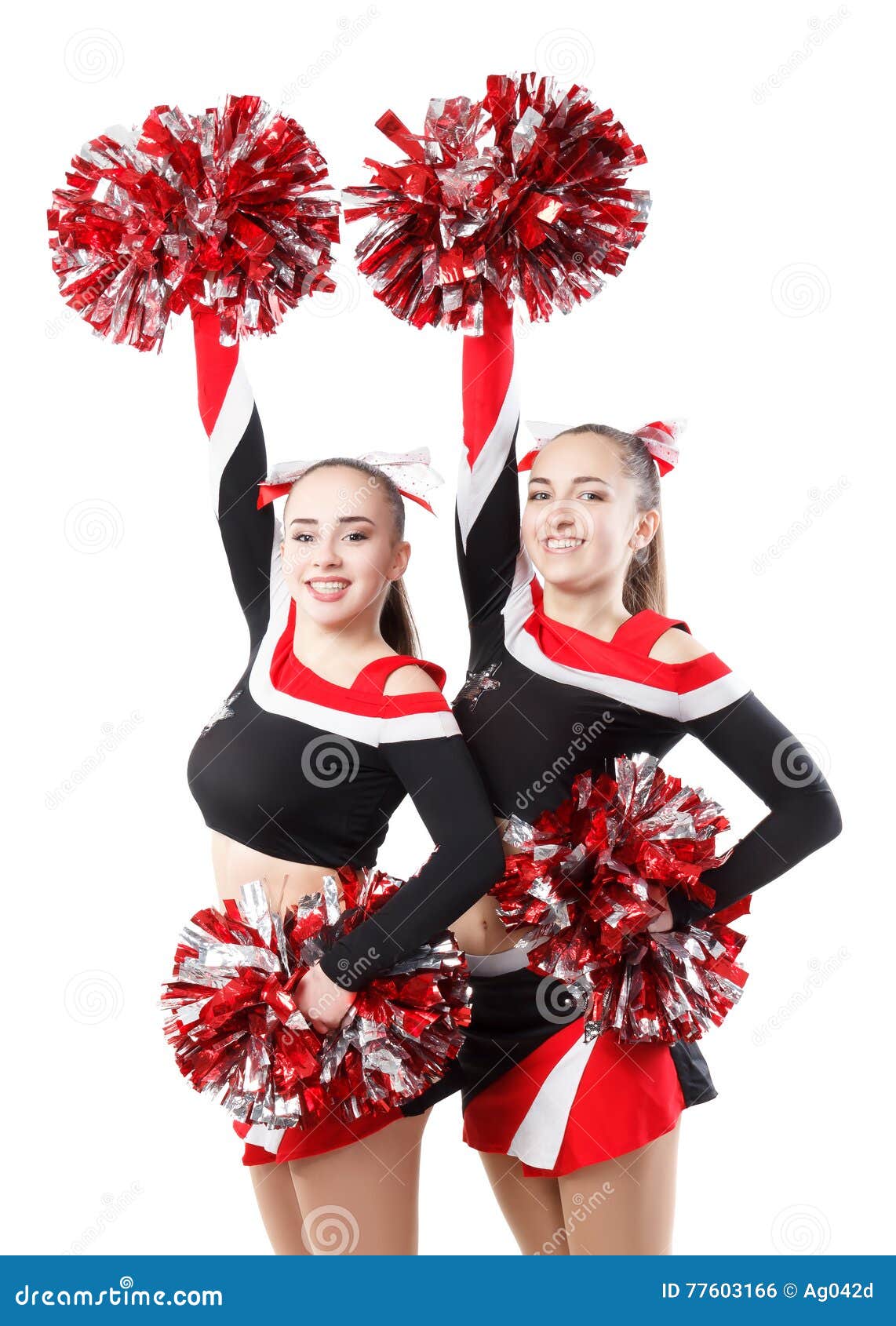 Two Professional Cheerleaders Posing At Studio. Side Split And Vertical ...