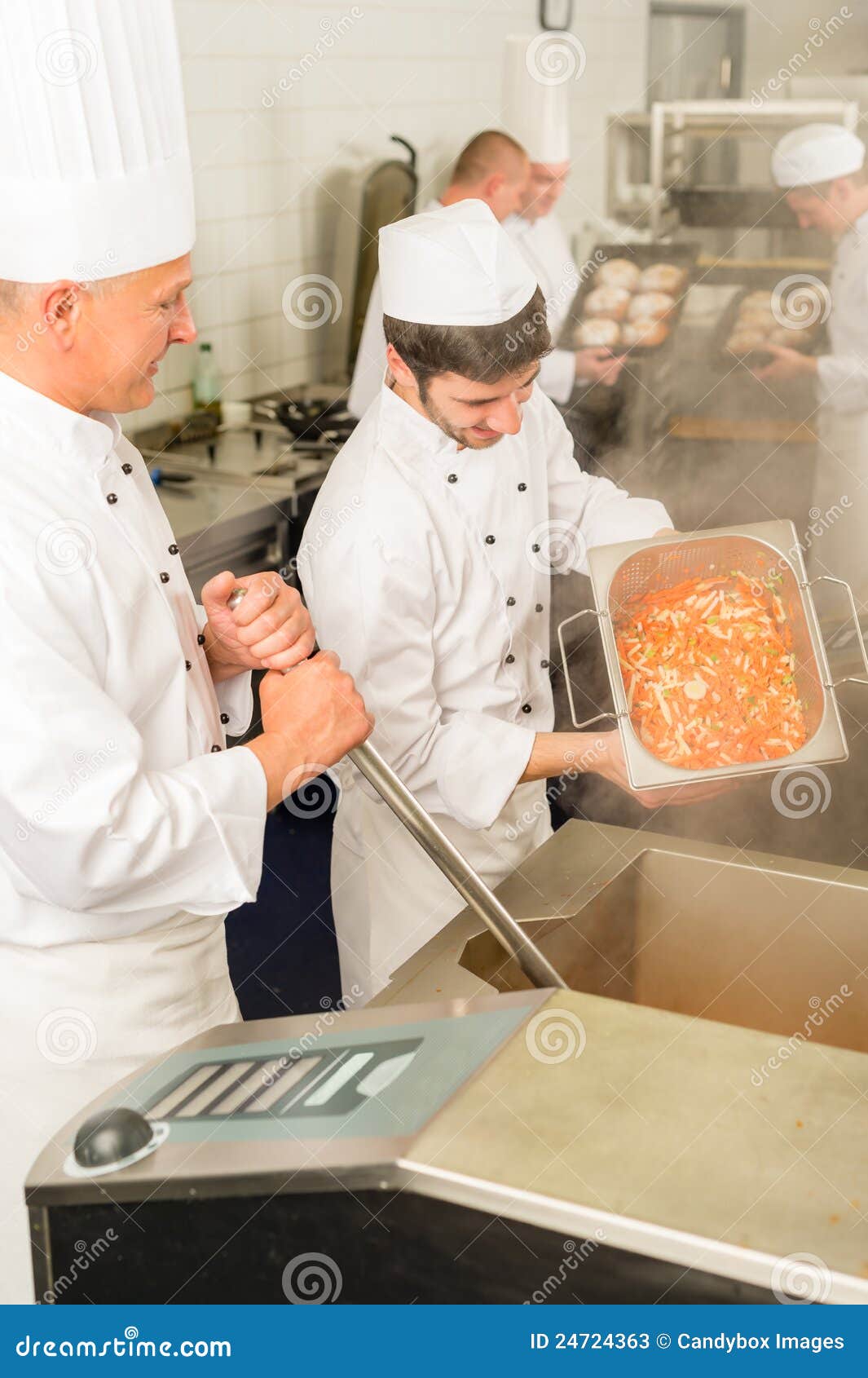 Two Professional Chefs Cooking in Kitchen Stock Image - Image of ...