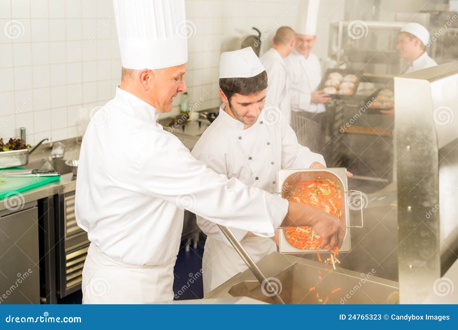 Two Professional Chefs Cooking in Kitchen Stock Image - Image of mature ...