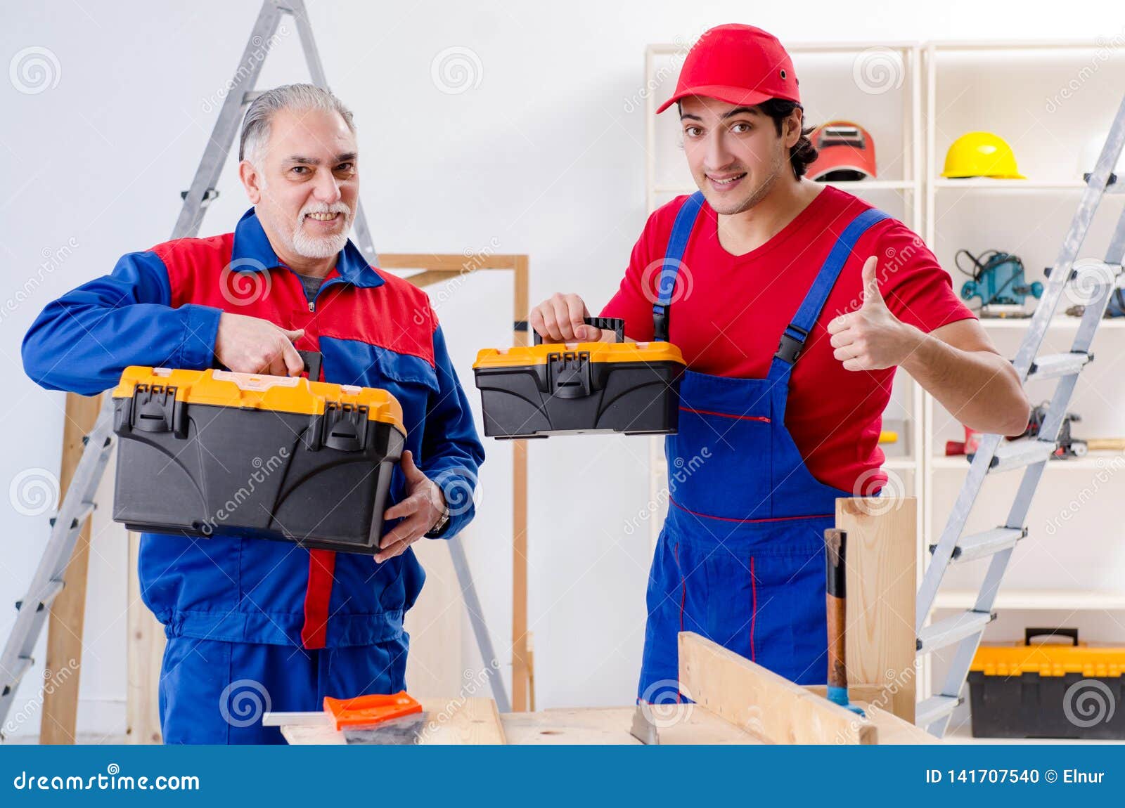 The Two Professional Contractors Laying Flooring at Home Stock Photo ...