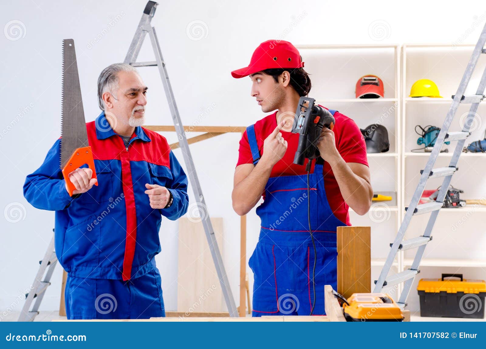 The Two Professional Contractors Laying Flooring at Home Stock Photo ...