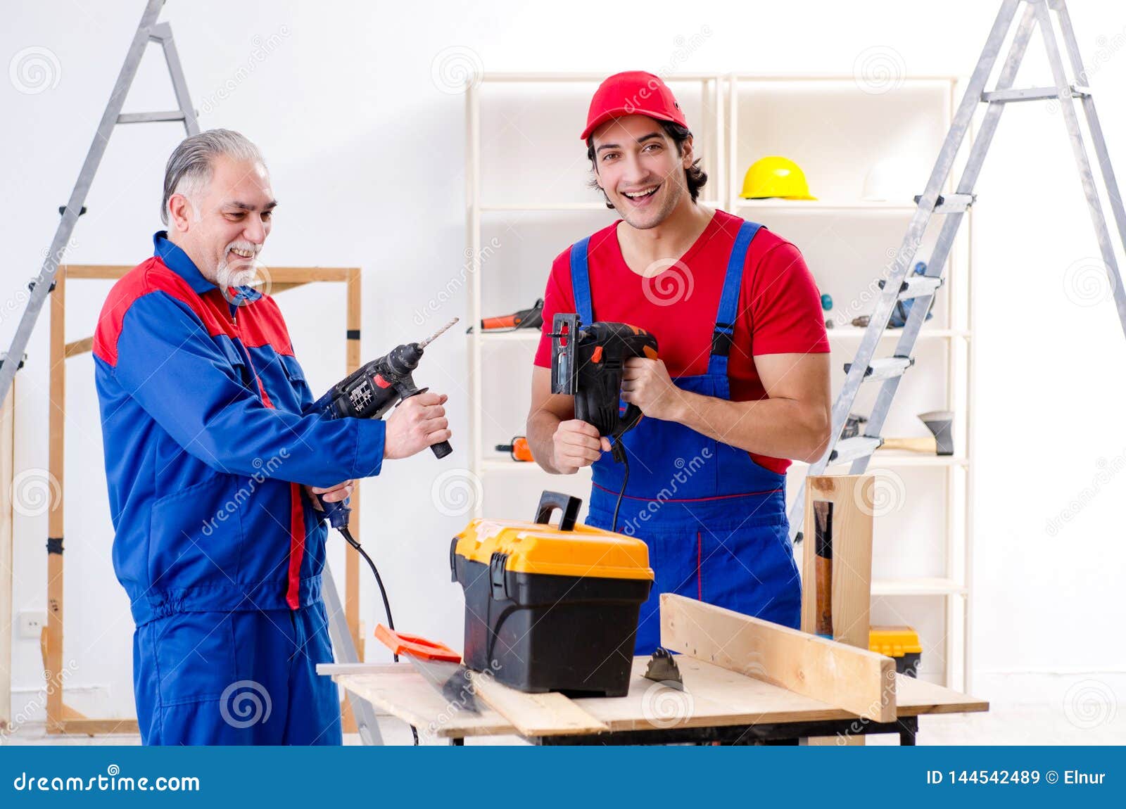 The Two Professional Contractors Laying Flooring at Home Stock Image ...