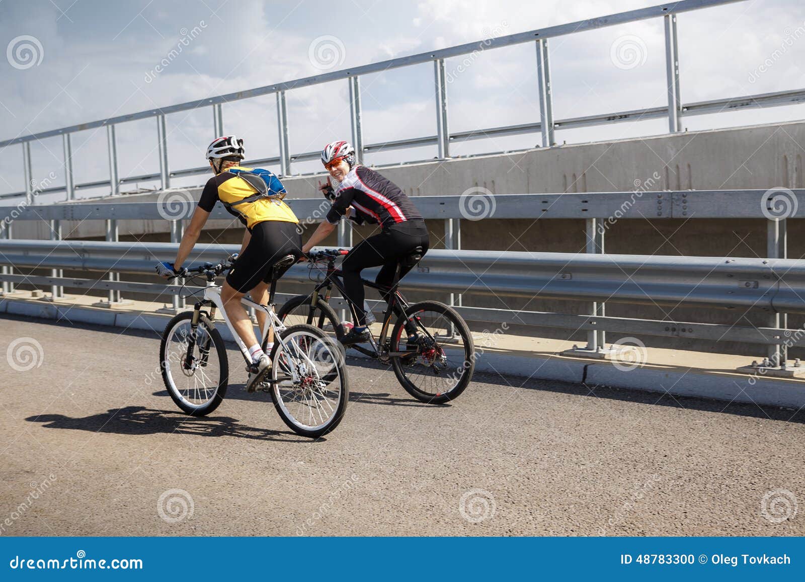 Two professional cyclists stock photo. Image of racer - 48783300