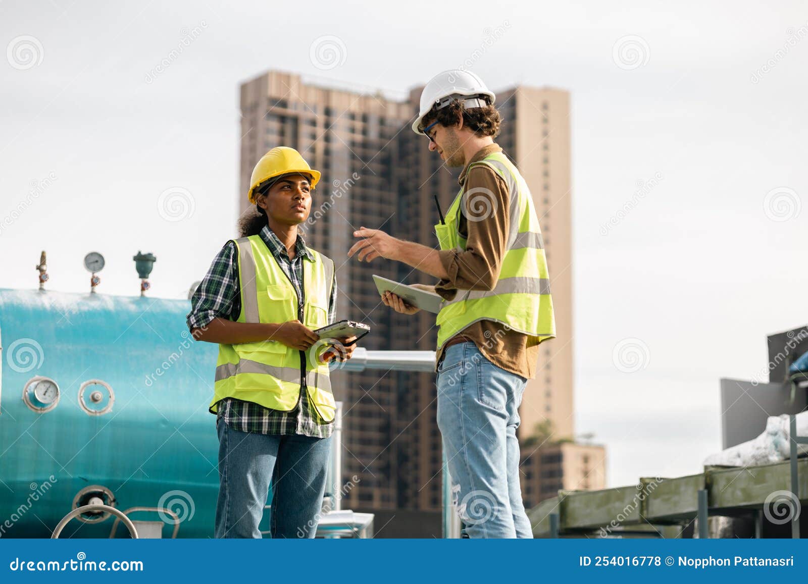 Two Professional Engineer Man and Women Working Checking and ...