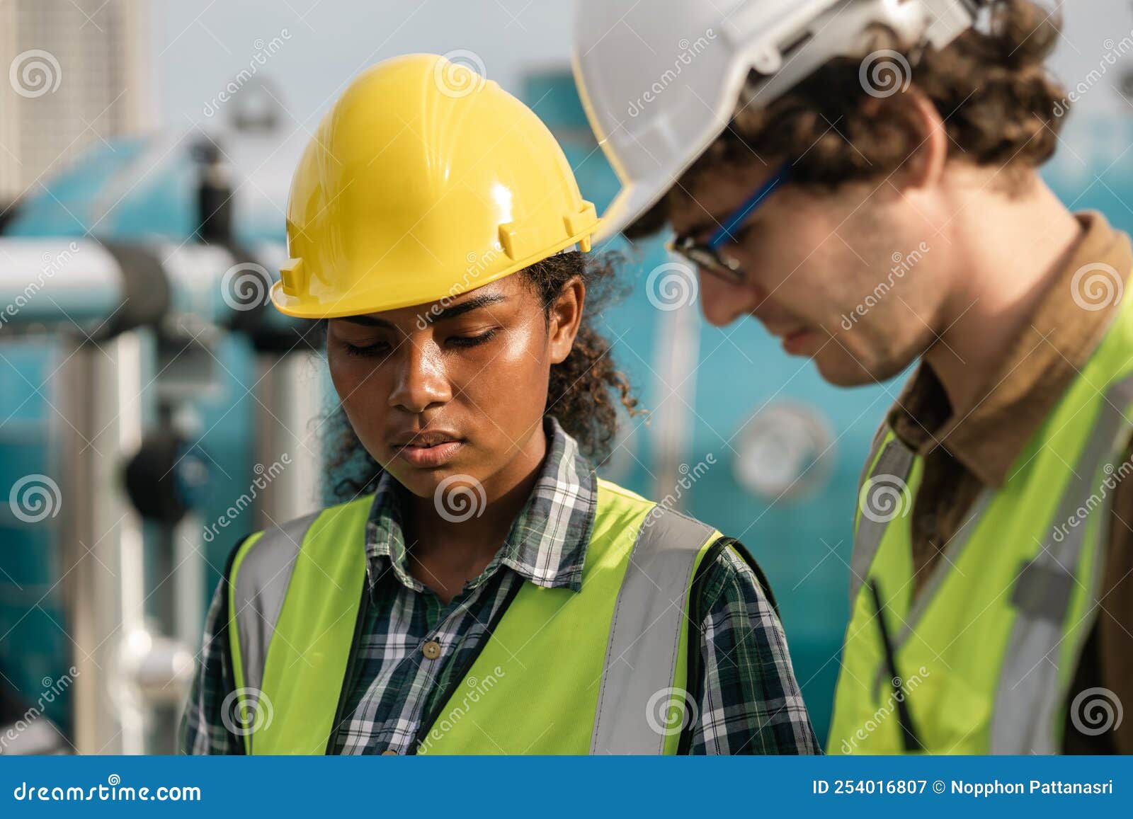 Two Professional Engineer Man and Women Working Checking and ...