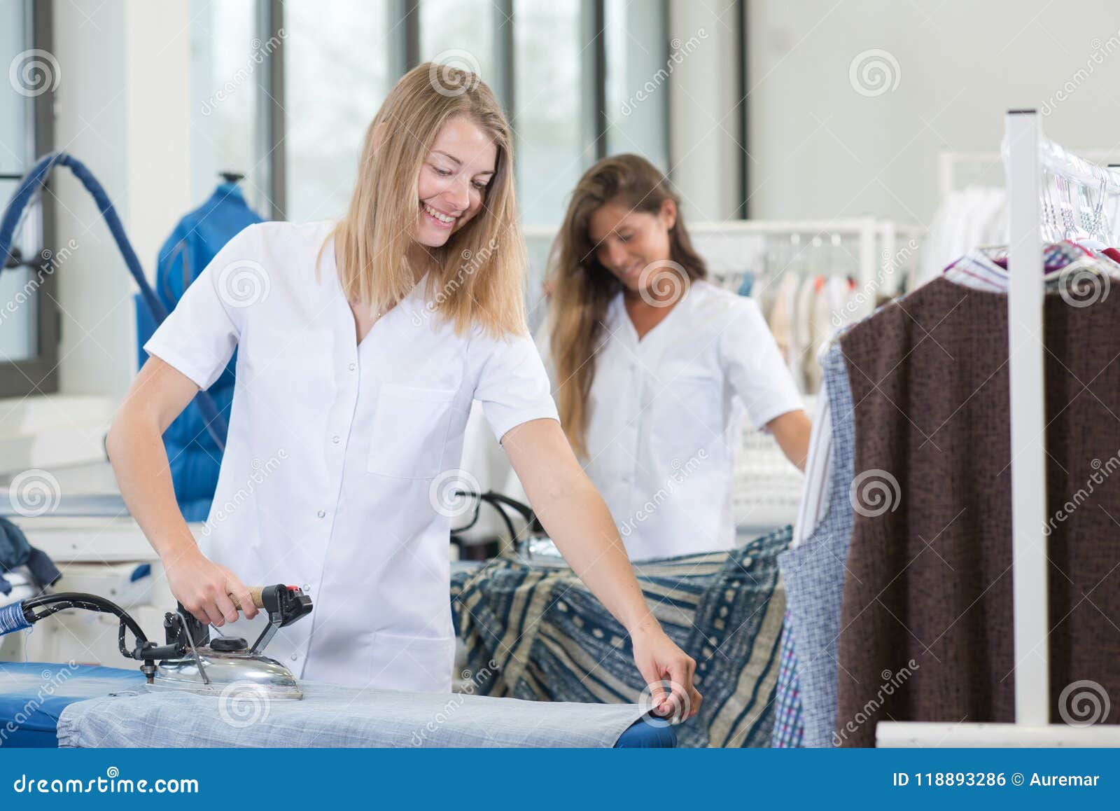 Two Professional Ladies Ironing Stock Photo - Image of bright, human ...