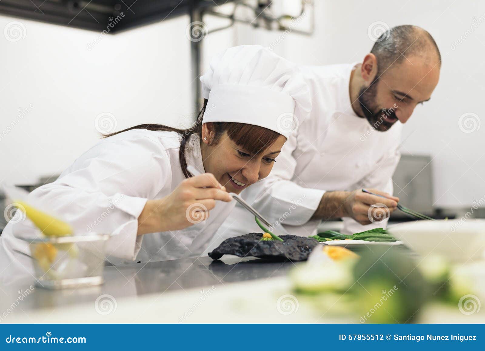 Two Professionals Chefs Cooking Together. Stock Photo - Image of happy ...
