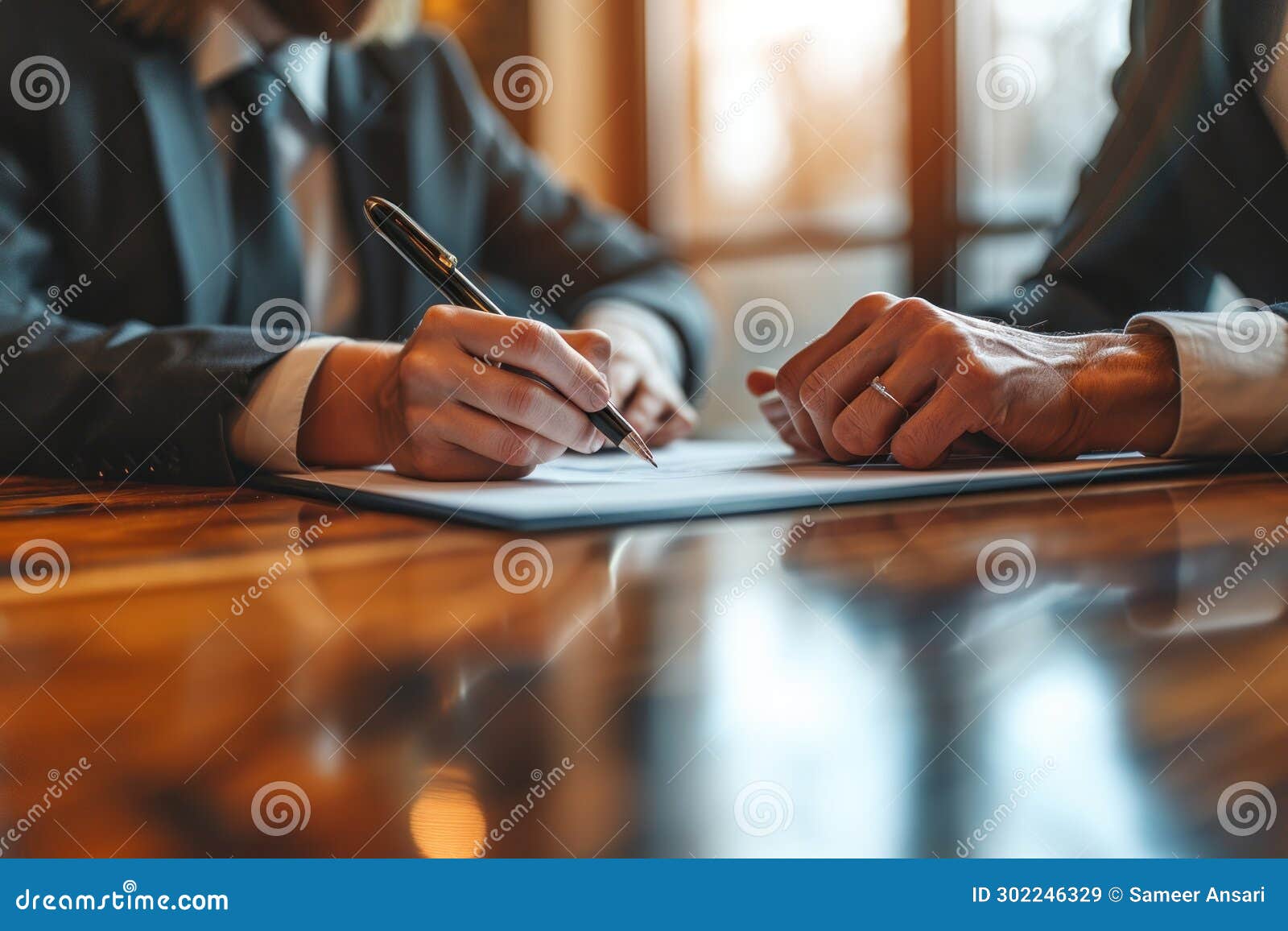 Two Professionals in a Meeting Signing Official Documents, Formal ...